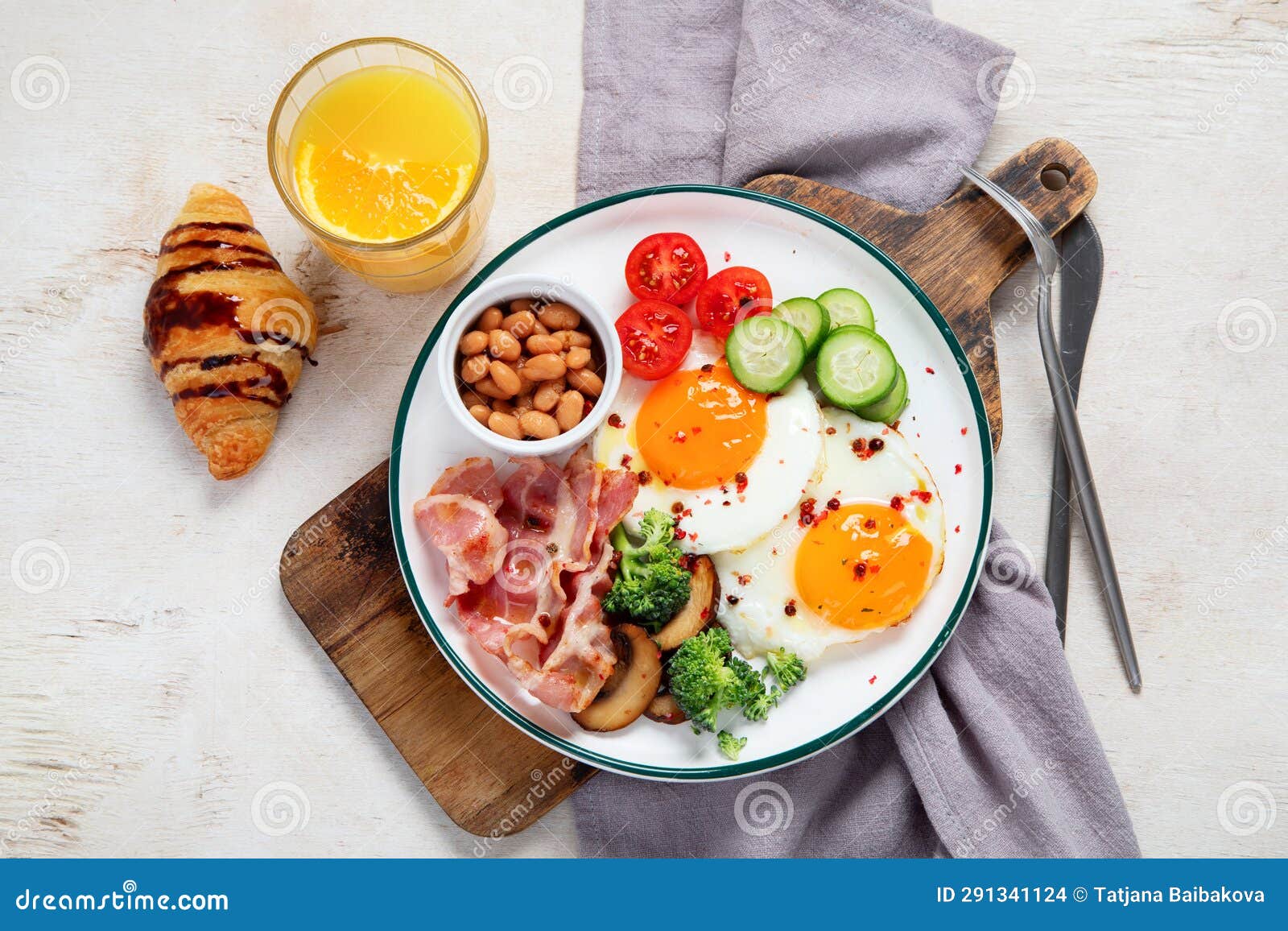 Traditional Englis Breakfast Plate with Bacon Strips, Sunny Side Up ...