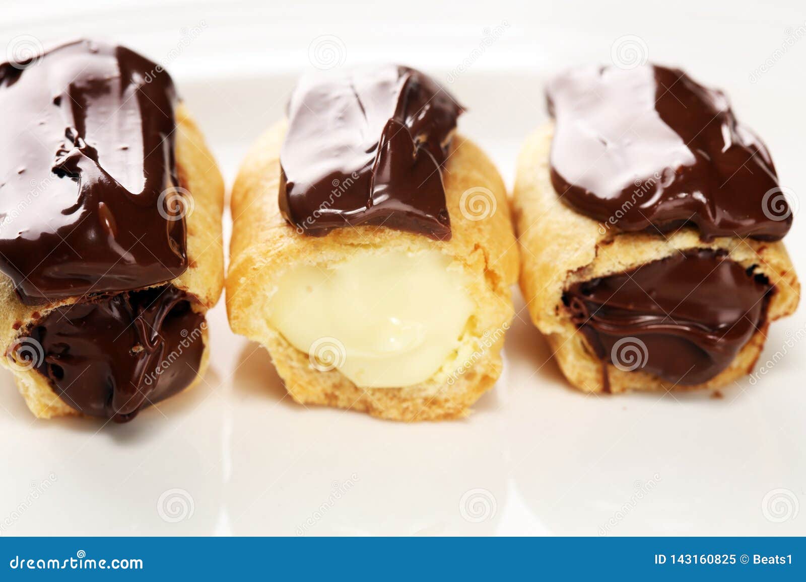 Traditional French Dessert. Eclair with Chocolate Icing. Pastery ...