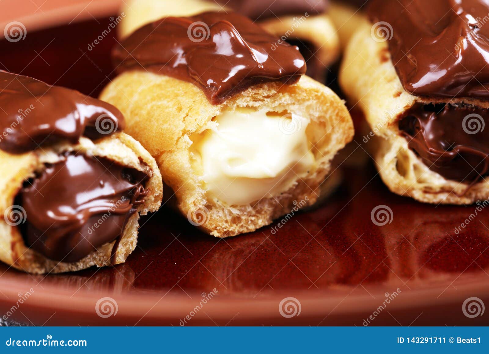 Traditional French Dessert. Eclair with Chocolate Icing. Pastery ...