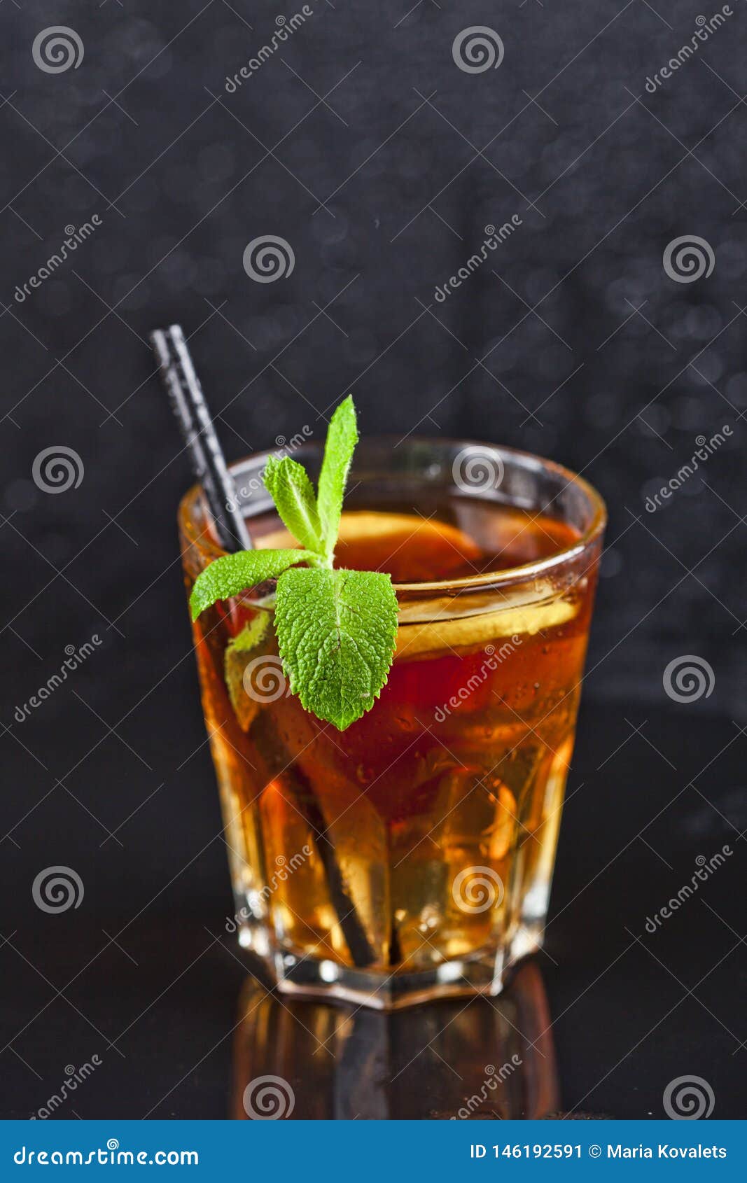 Traditional Fresh Iced Tea With Lemon Mint Leaves And Ice Cubes In