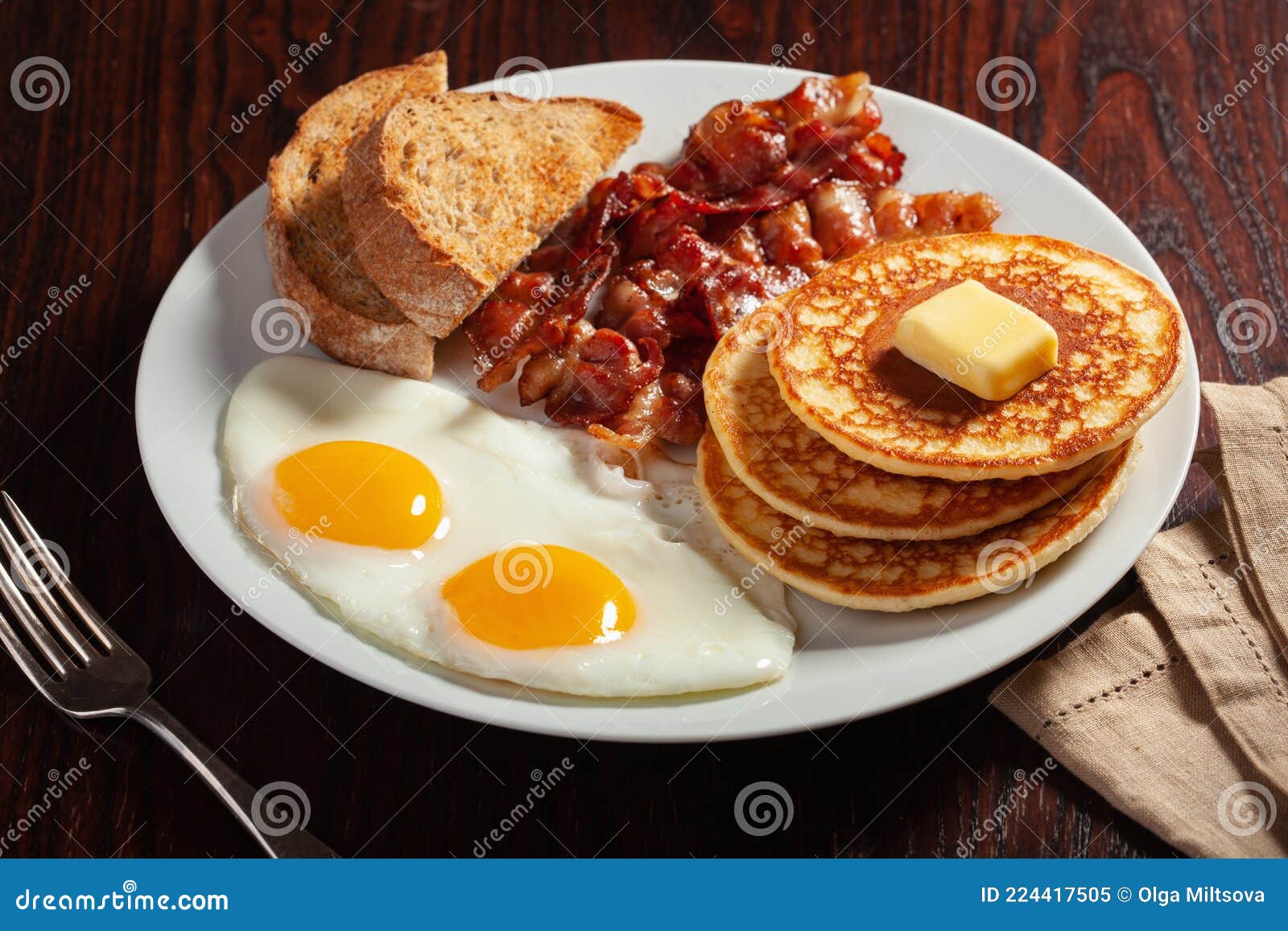 Traditional Full American Breakfast Eggs Pancakes with Bacon and Toast ... Traditional Full American Breakfast Eggs Pancakes with Bacon and Toast ...