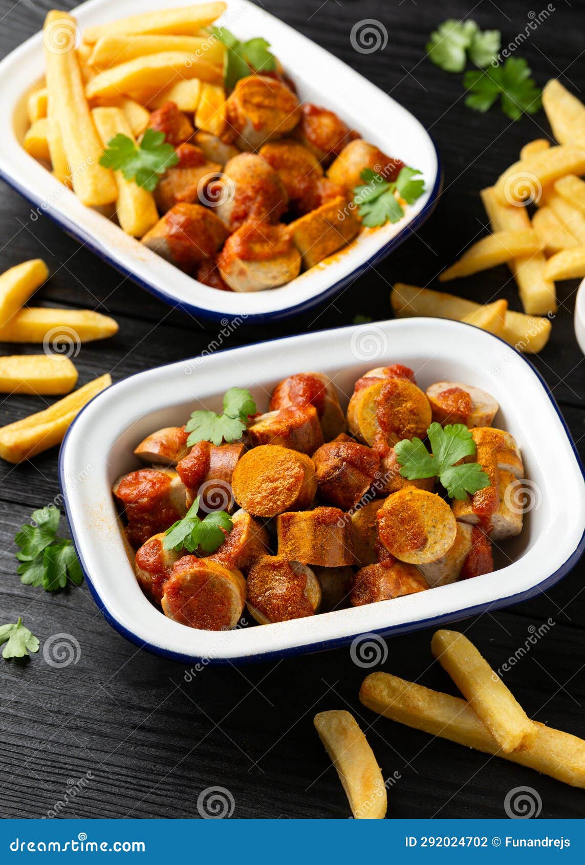 Traditional German Currywurst, Served with Potato Chips and Sauce Stock ...