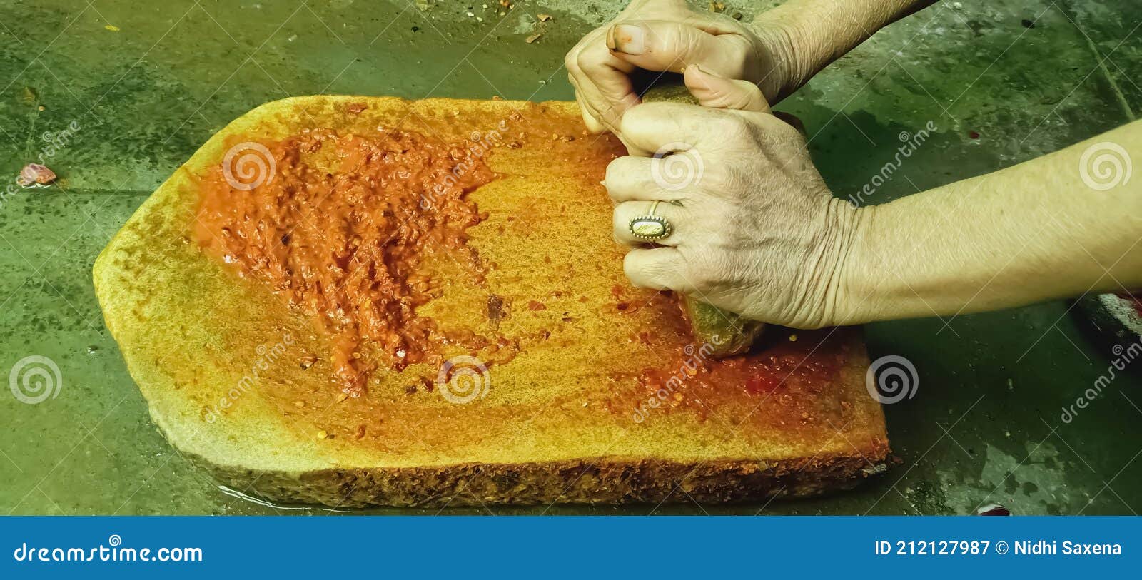 Traditional Grinding Whole Spices on Grindstone Stock Image - Image of ...