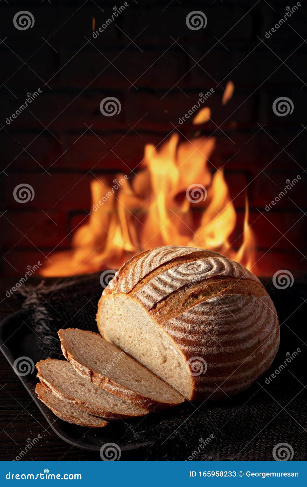 Traditional House Bread on the Table in Front of a Red Bricks Stock ...