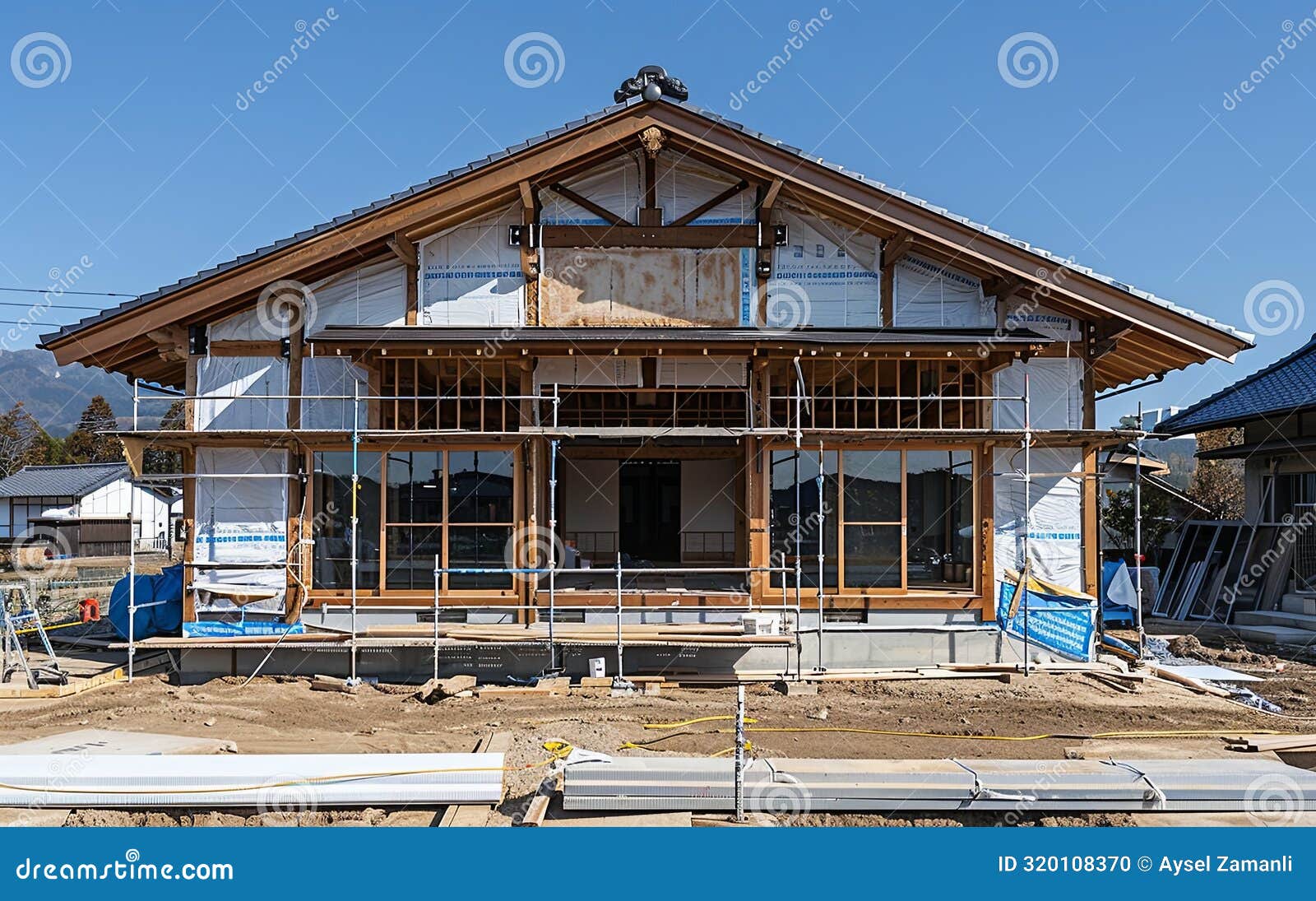 Traditional House Undergoing Retrofitting Construction during Sunny Day ...