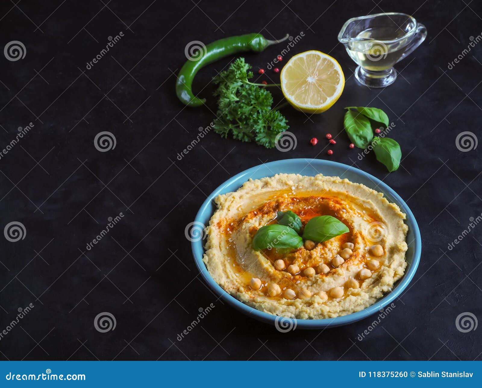 Traditional Hummus on a Black Kitchen Table. Stock Photo - Image of ...