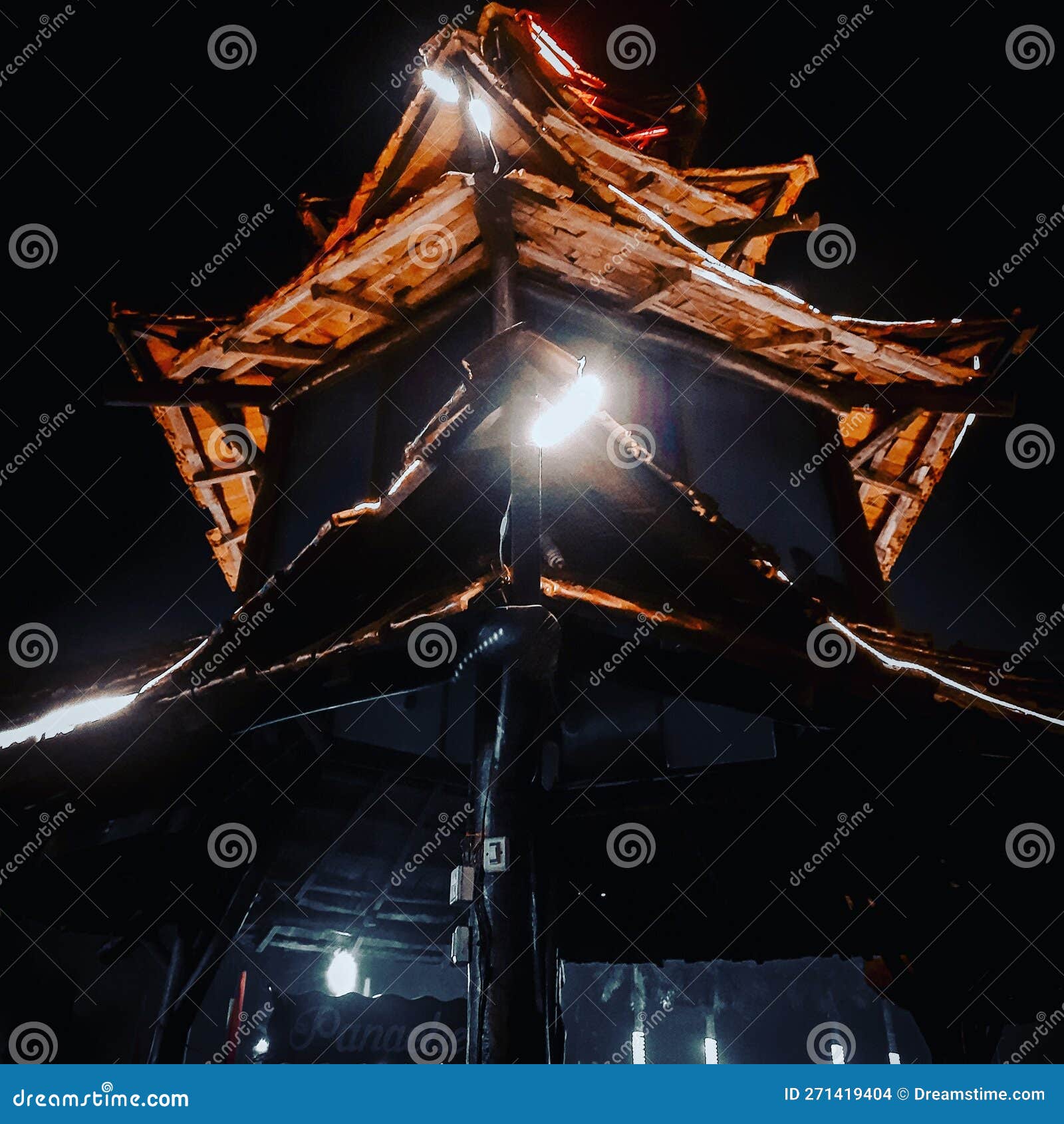 Traditional hut at night stock photo. Image of traditional - 271419404