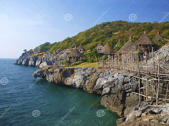 Traditional Huts on the Island Cliff Stock Photo - Image of rock, cliff ...