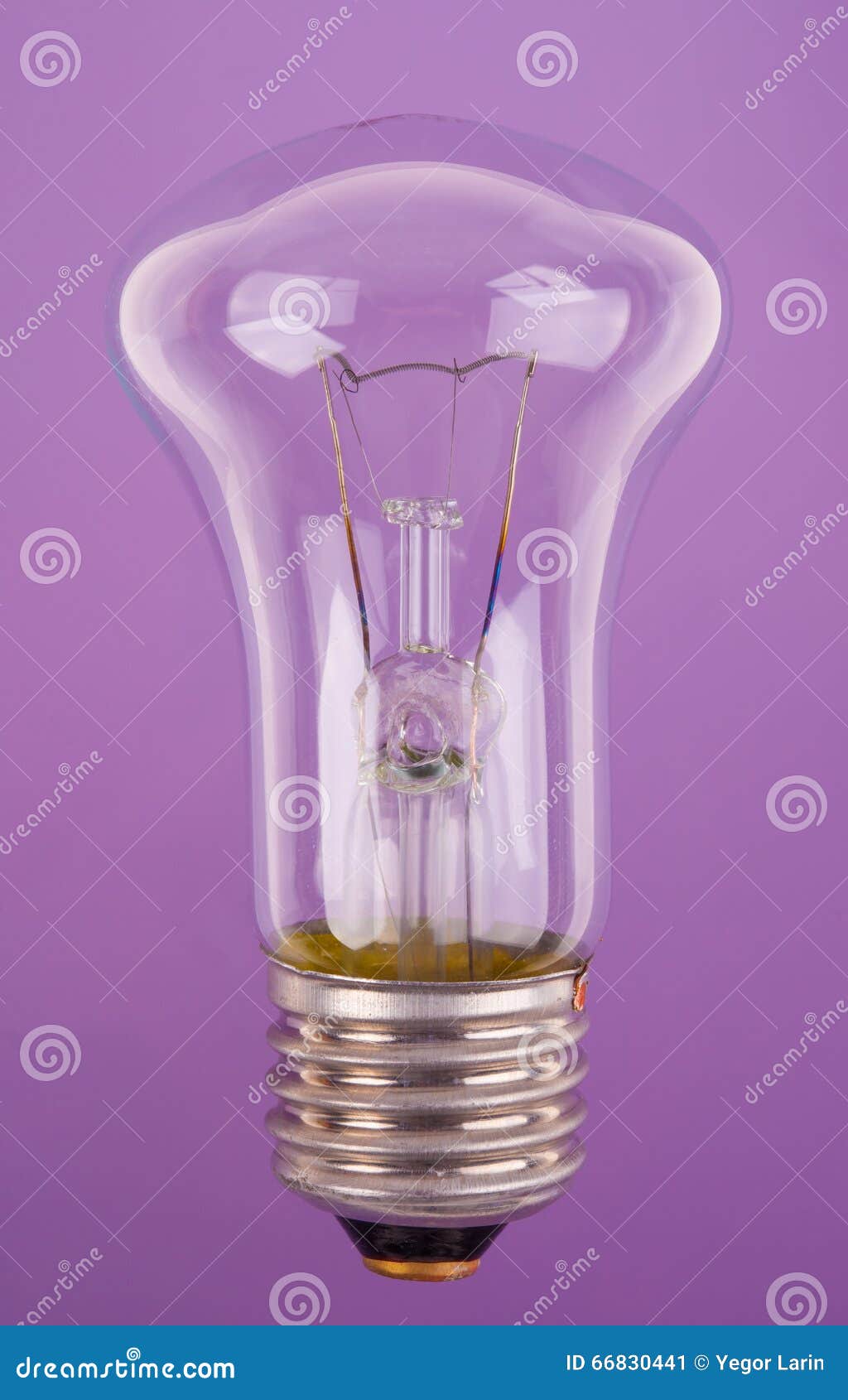 Traditional Incandescent Light Bulb on Blue Purple Background Stock ...