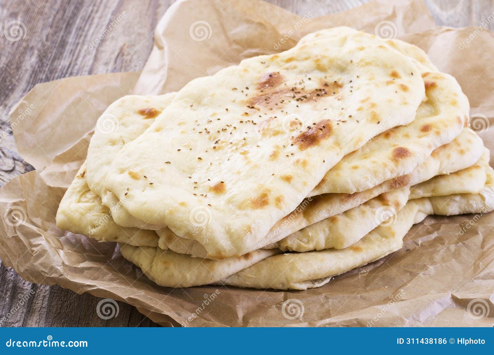 Traditional Indian Chapati Bread Served As Stack on a Brown Backing ...