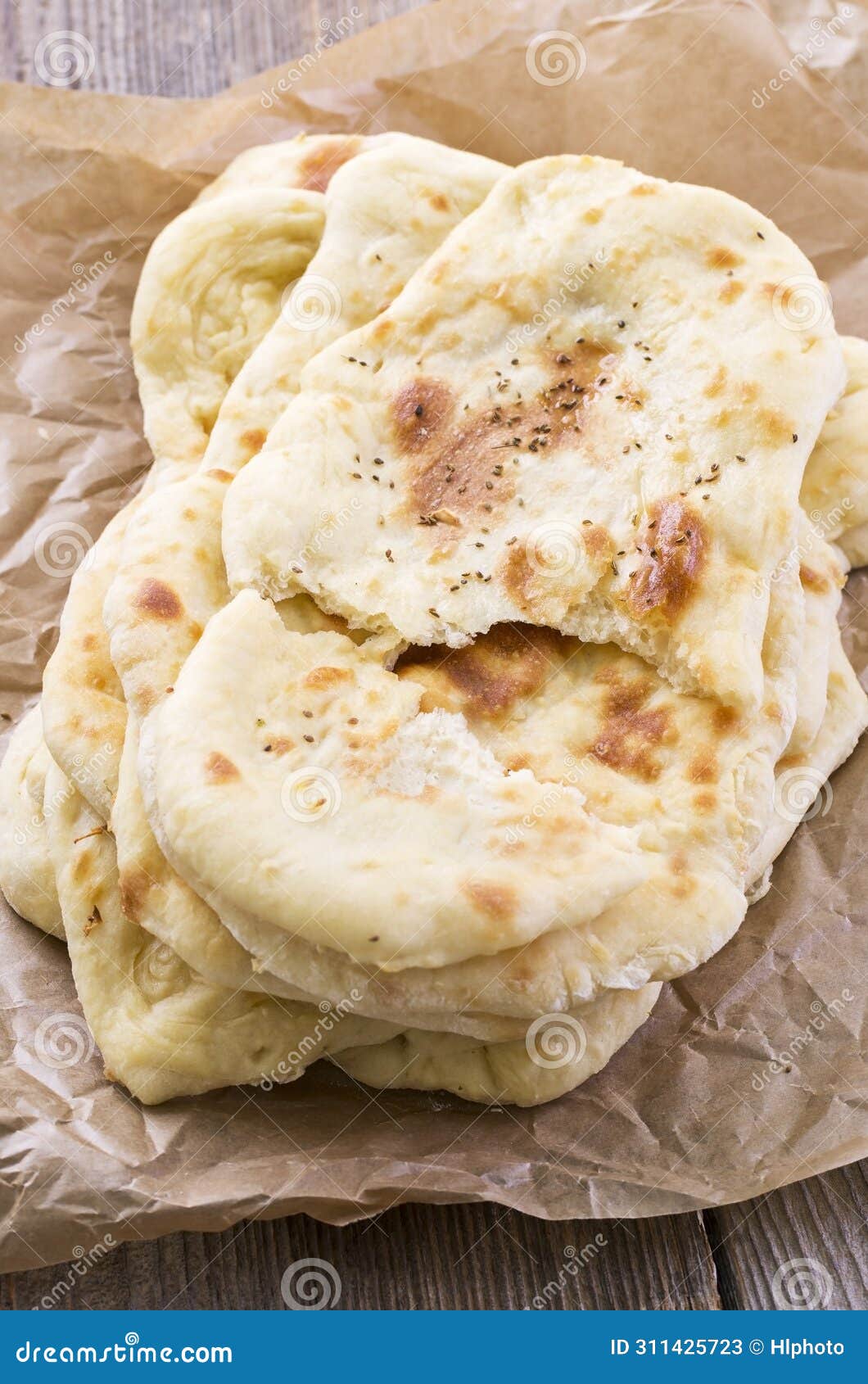 Traditional Indian Chapati Bread Served As Stack on a Brown Backing ...