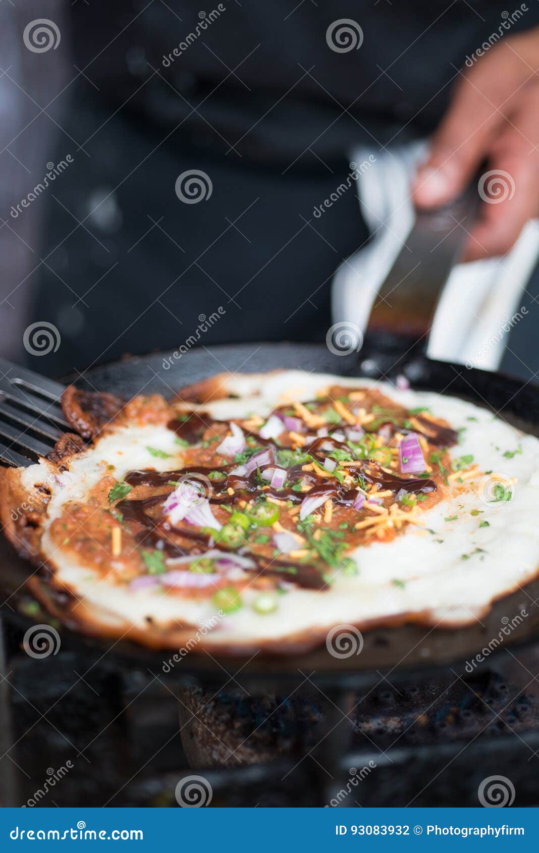 Traditional Indian Dosa Cooked on Hot Round Griddle Stock Photo - Image ...