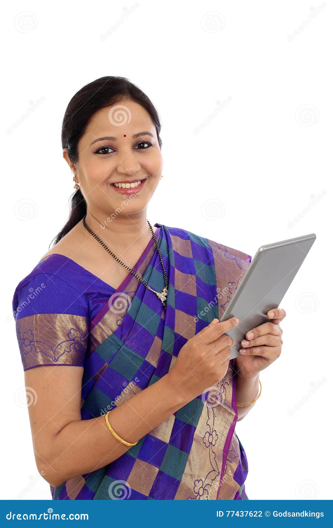 Traditional Indian Woman Using a Tablet Computer Stock Photo - Image of ...