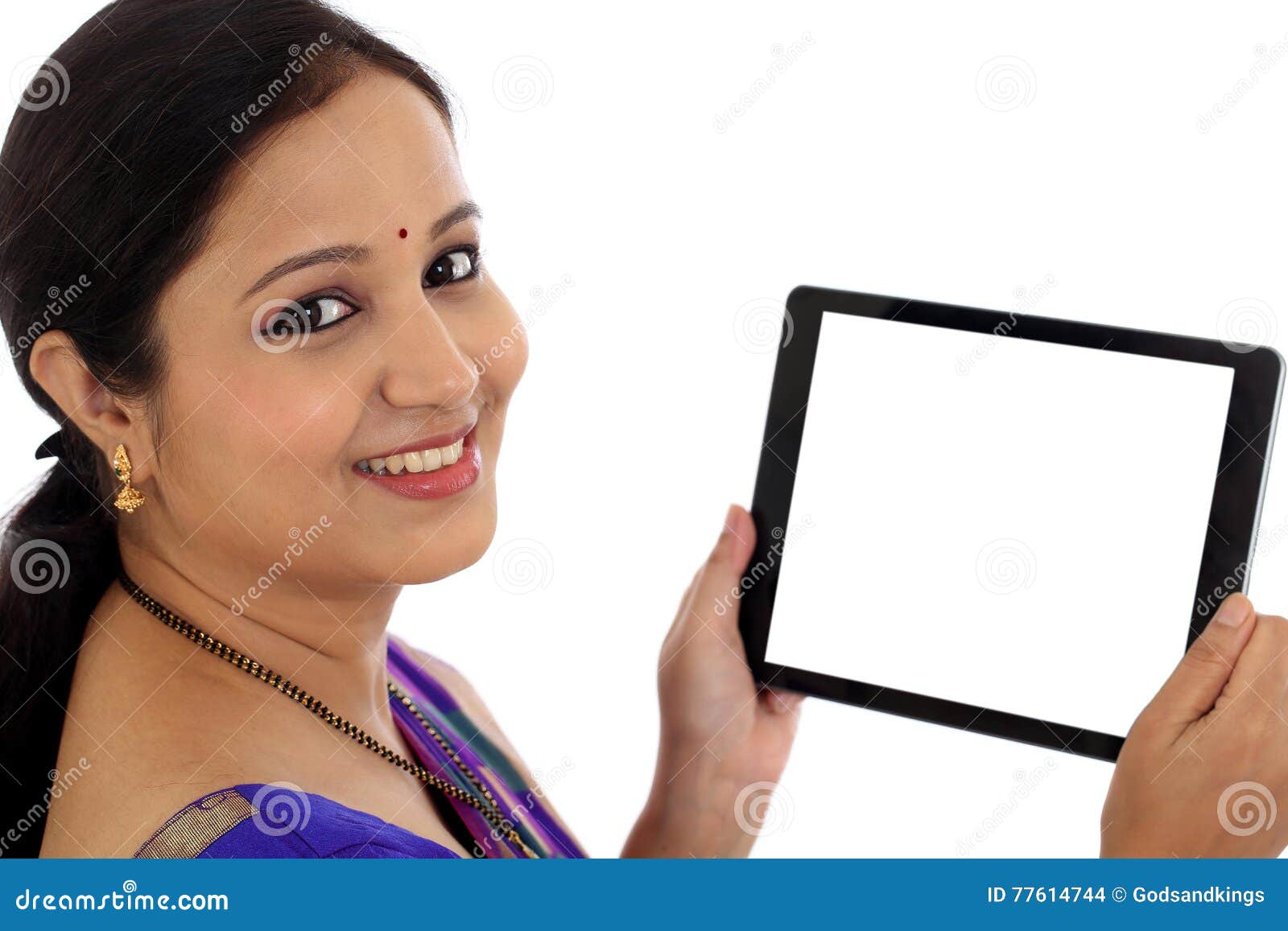 Traditional Indian Woman Using a Tablet Computer Stock Photo - Image of ...