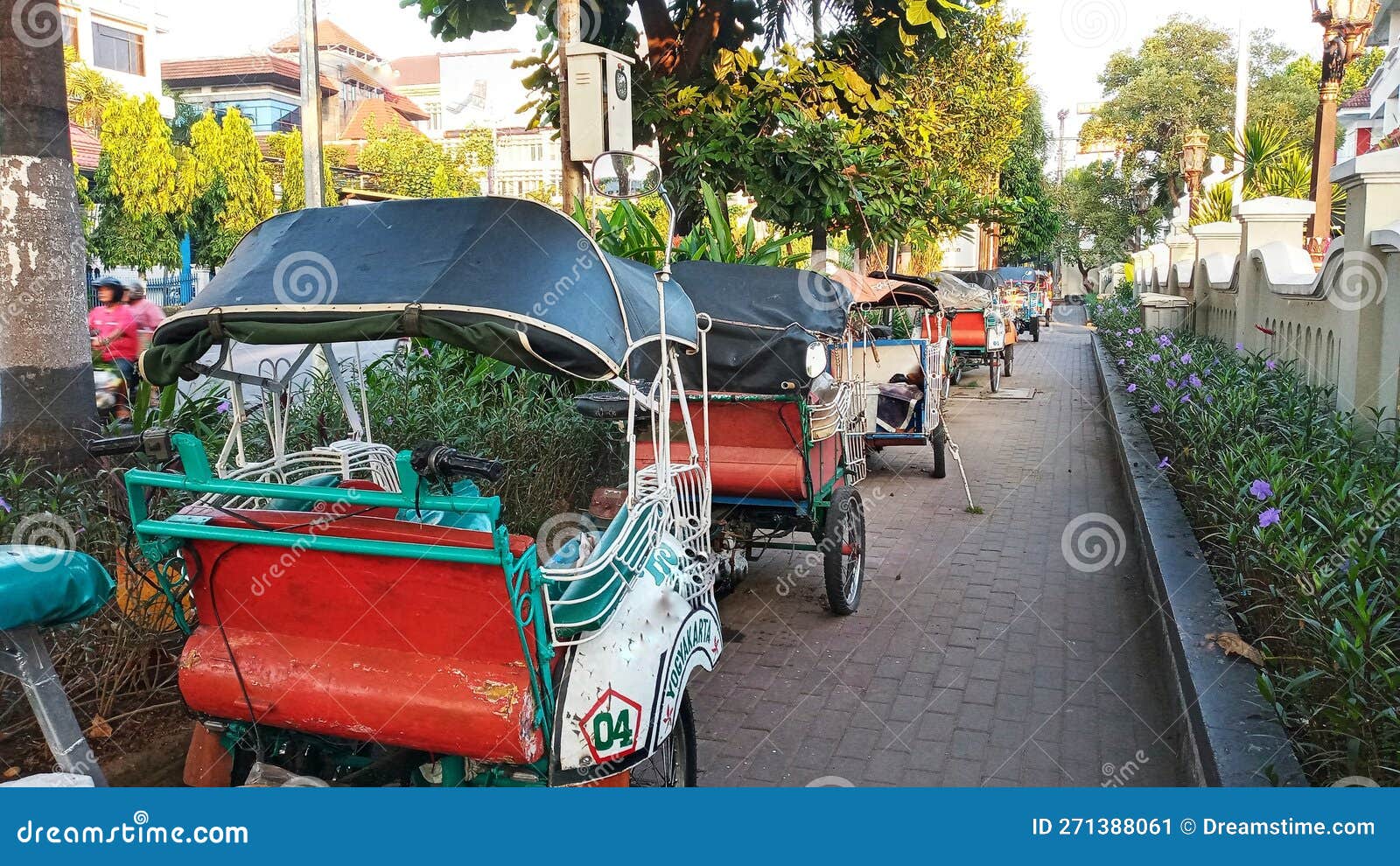 Traditional Becak Tricycle Adorned With Batik Patterns In An Indonesian ...