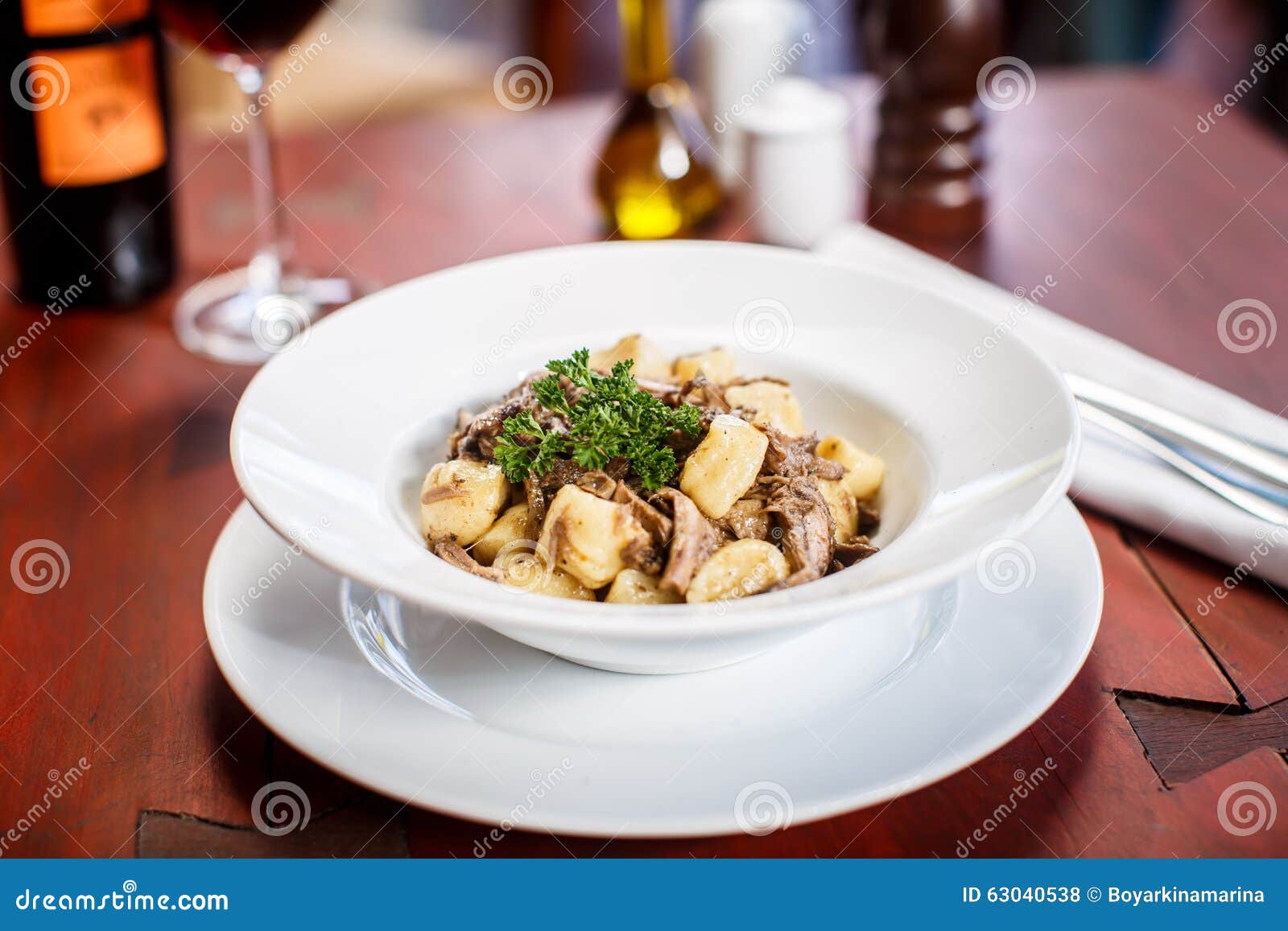 Traditional Italian Dishes Gnocchi with Duck Stock Photo - Image of ...