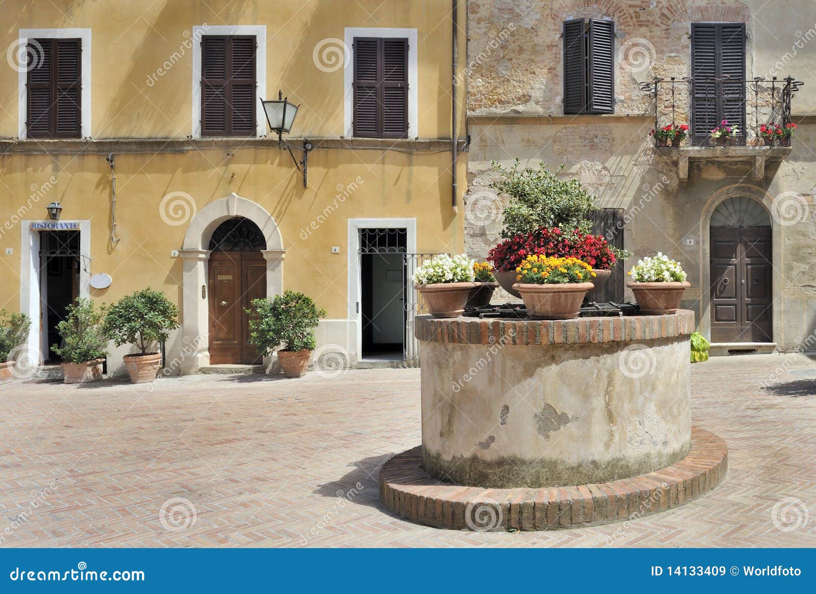 Traditional italian piazza stock image. Image of green - 14133409