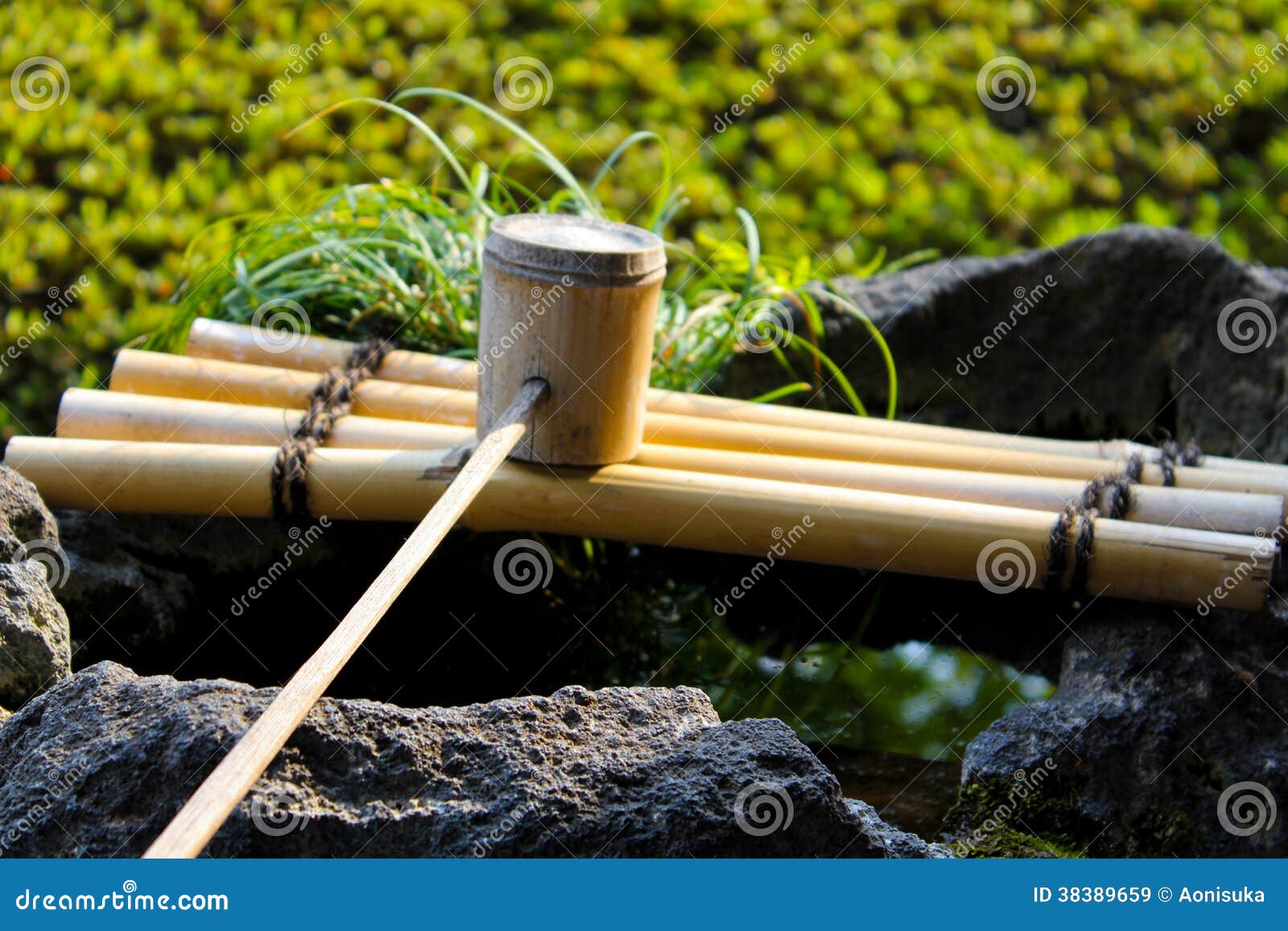 Bamboo Dipper Of Tsukubai Water Fountain In Japanese Garden At Kita-in ...