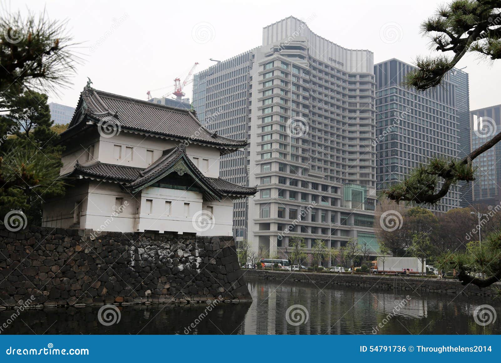 Traditional Japanese Building and Modern Office Building. Stock Photo ...