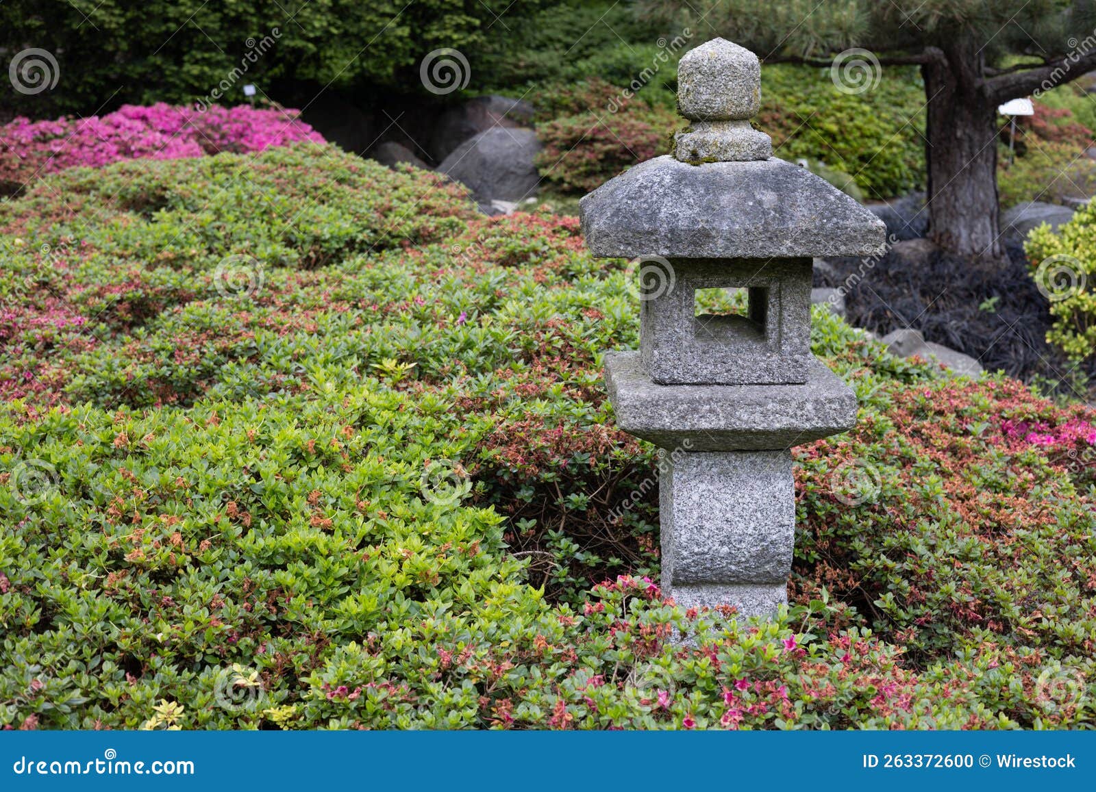 Traditional Japanese Toro Lantern Made of Stone Placed in a Park Stock ...