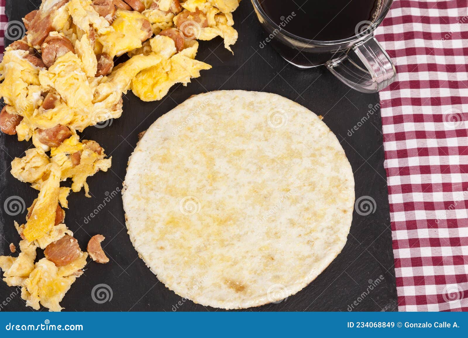 Traditional Latin American Breakfast; White Corn Arepa with Scrambled ...