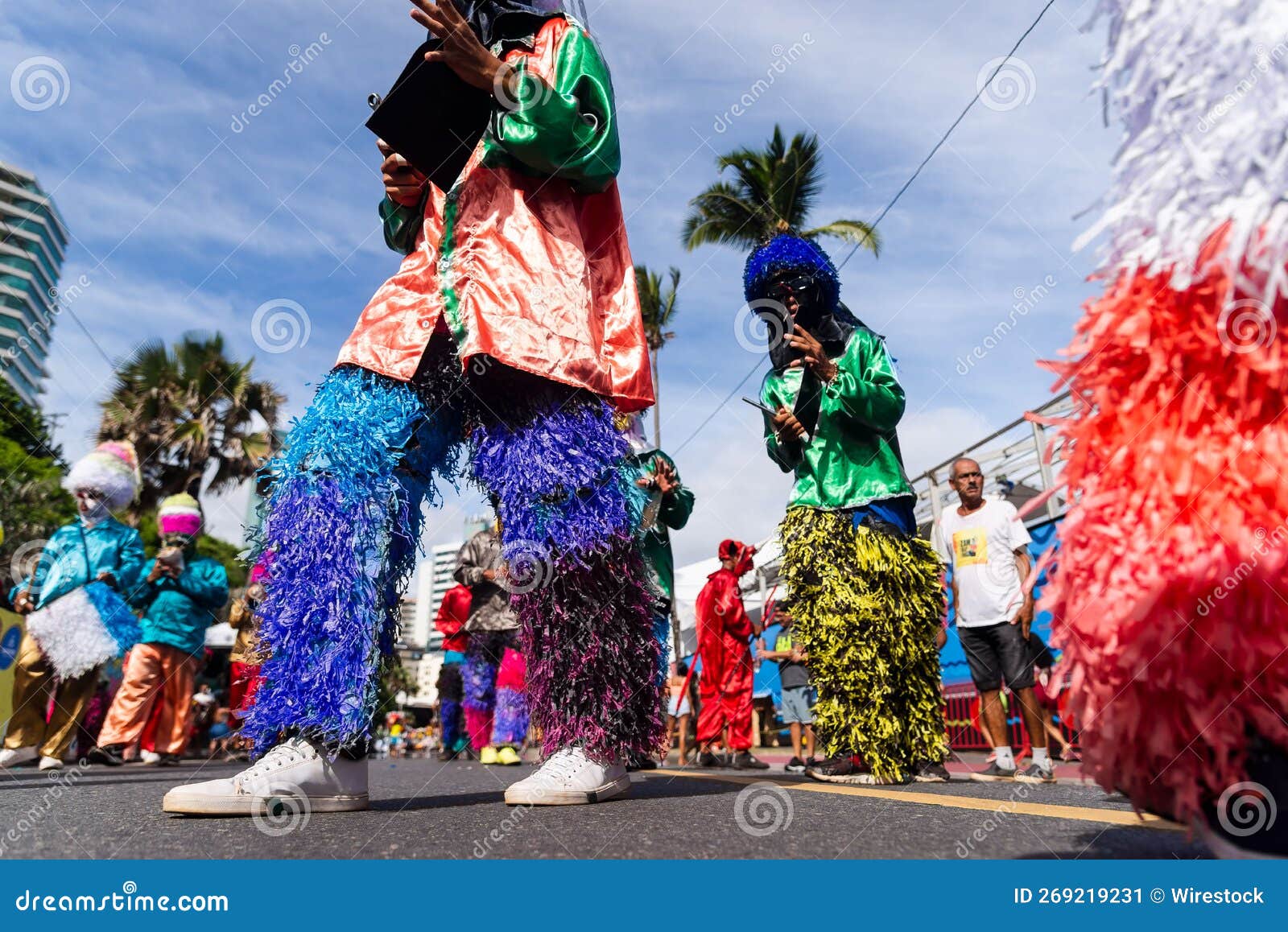 Traditional Masqueraders Make a Presentation Playing Percussion ...