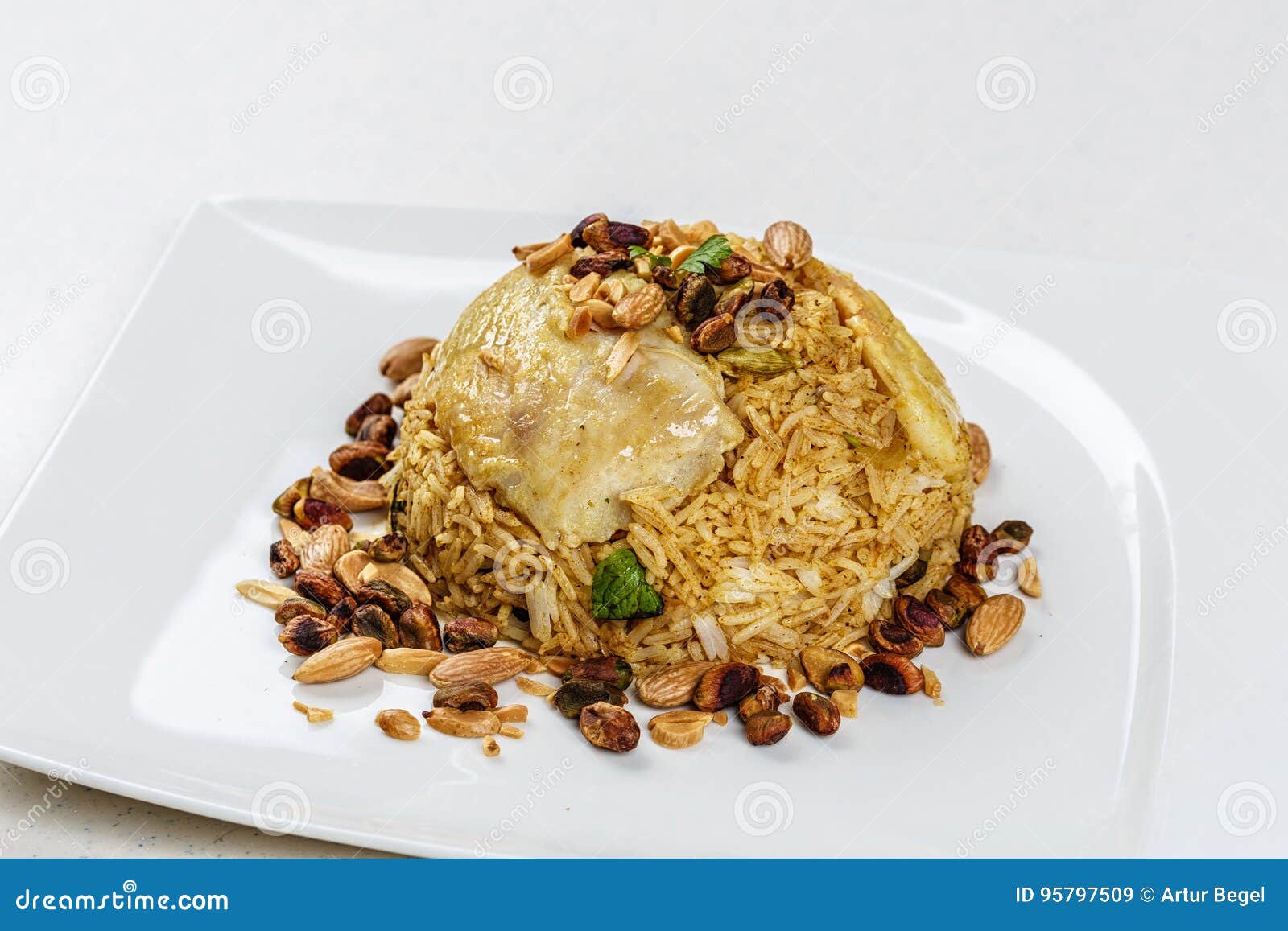 Traditional Middle Eastern Fish and Fried Rice Dish with Fried Pine ...