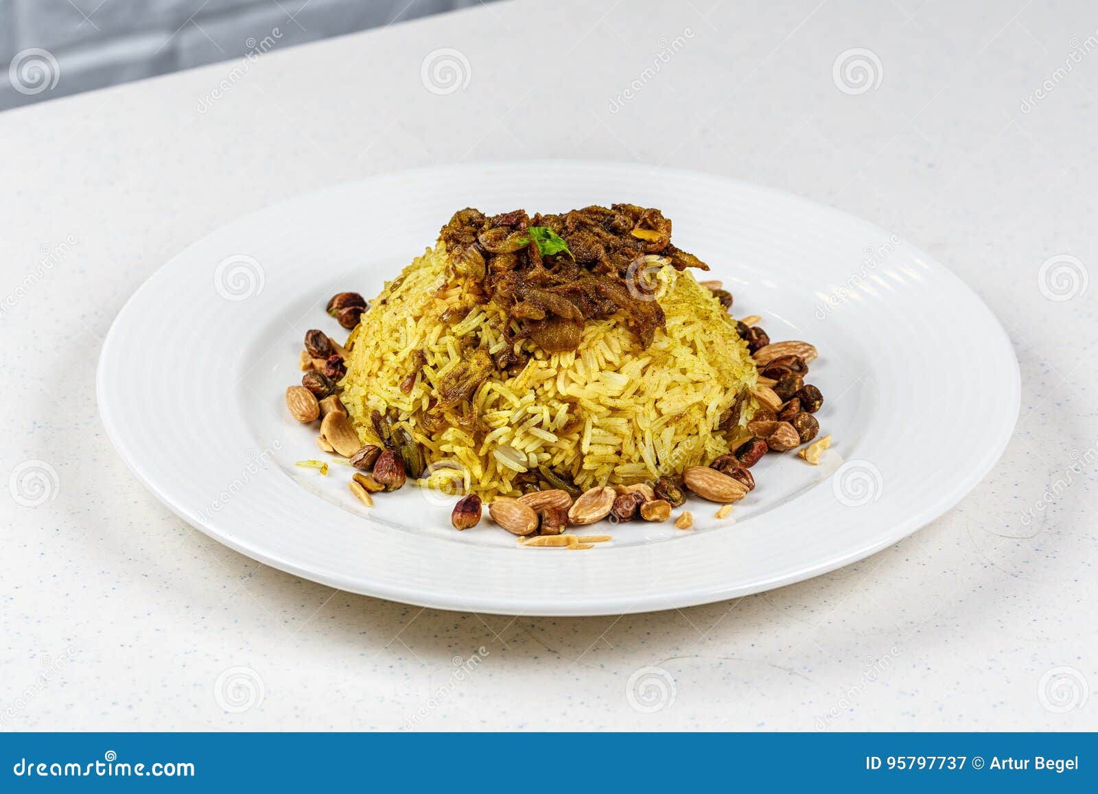 Traditional Middle Eastern Fish and Fried Rice Dish with Fried Pine ...