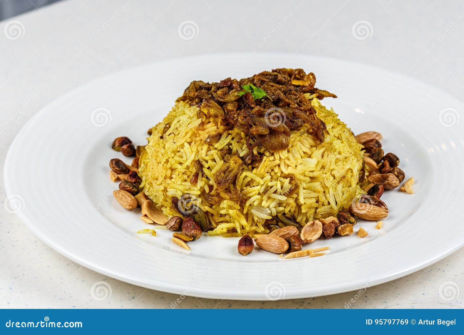 Traditional Middle Eastern Fish and Fried Rice Dish with Fried Pine ...