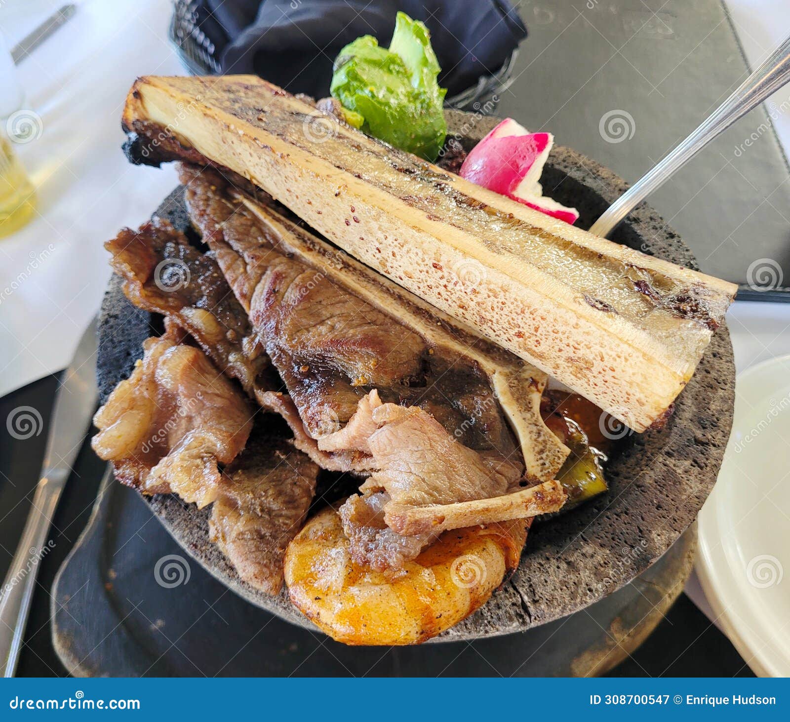 View of Authentic Molcajete Bowl Filled with Grilled Meats and Salsa ...