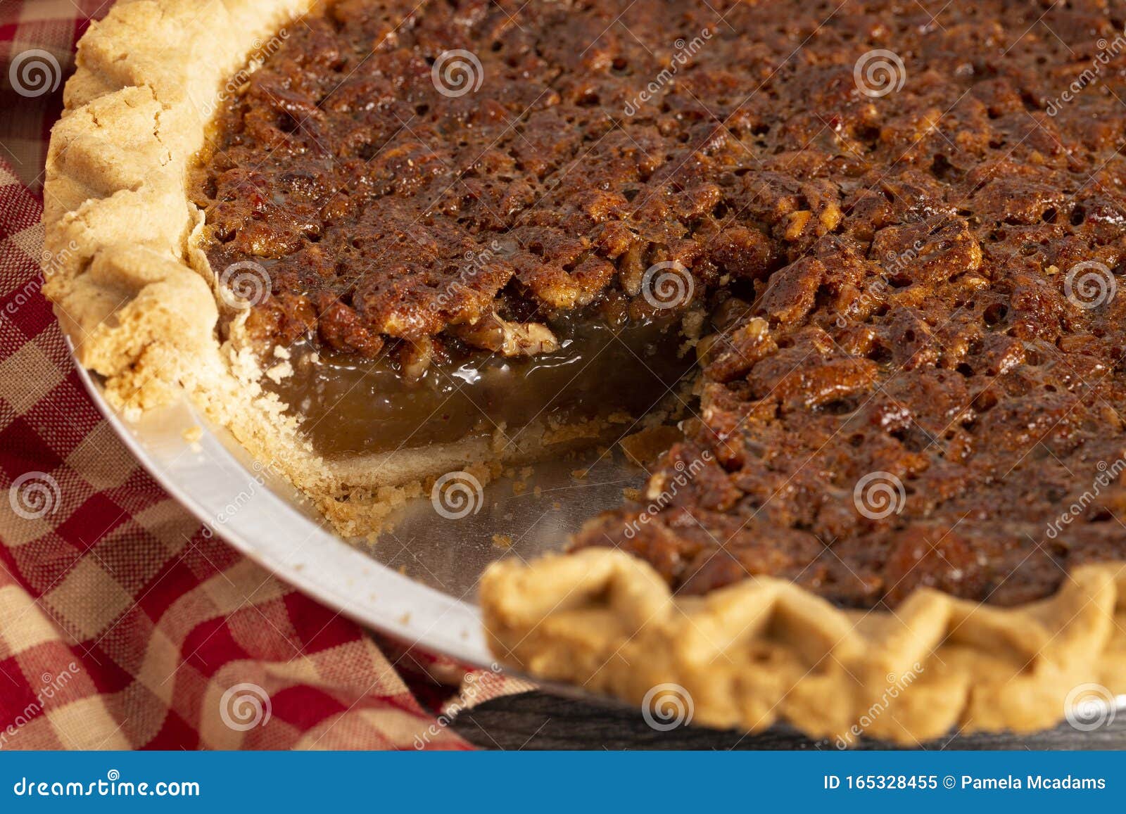 A Traditional Pecan Pie with a Slice Cut Out Stock Image - Image of ...