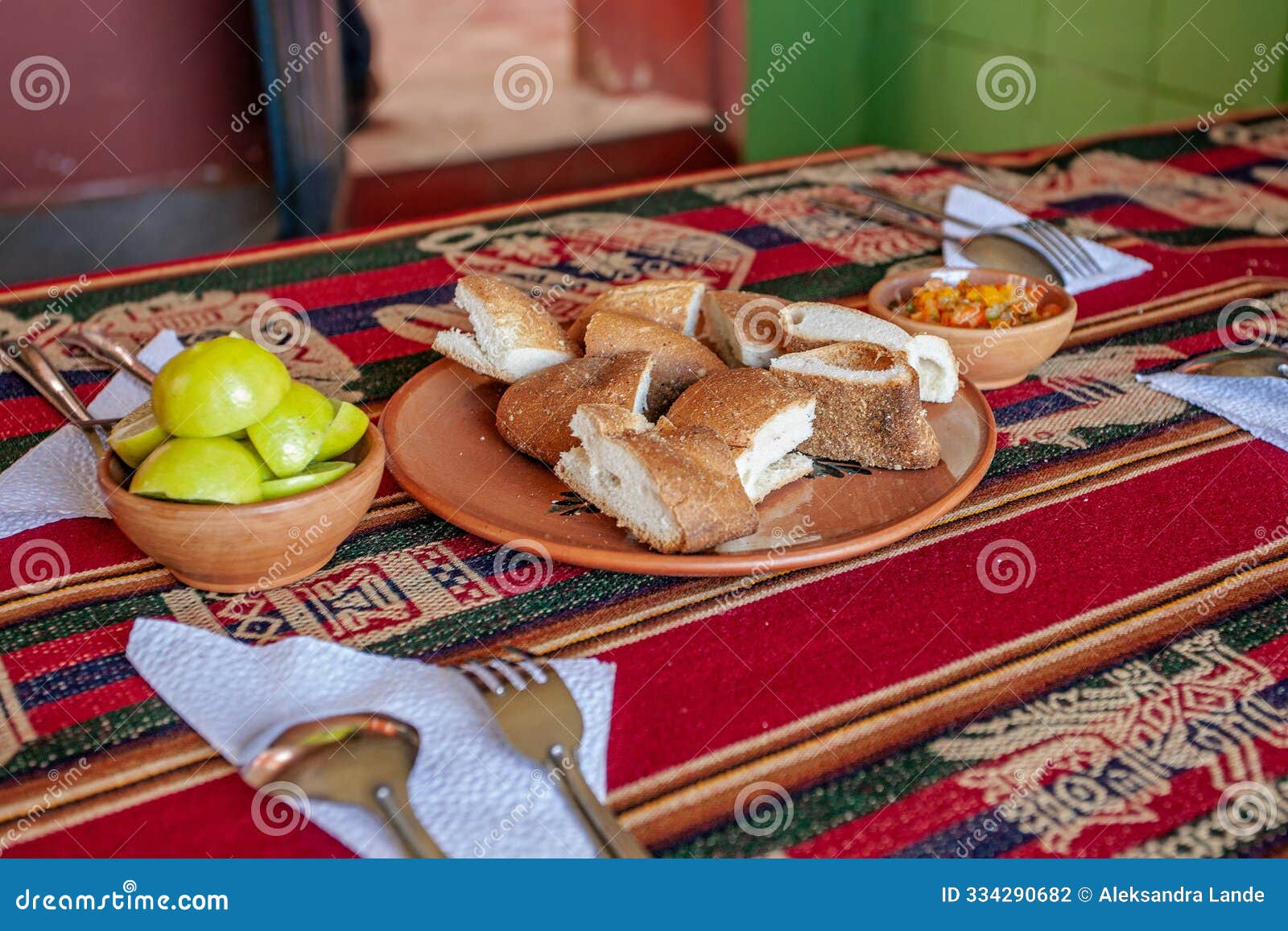 Traditional Peru Dinner, Bread Tortilla and Lime on the Table Stock ...
