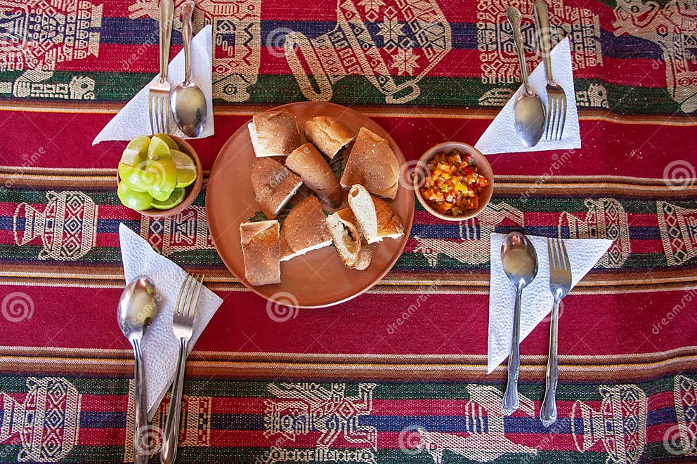 Traditional Peru Dinner, Bread Tortilla and Lime on the Table Stock ...