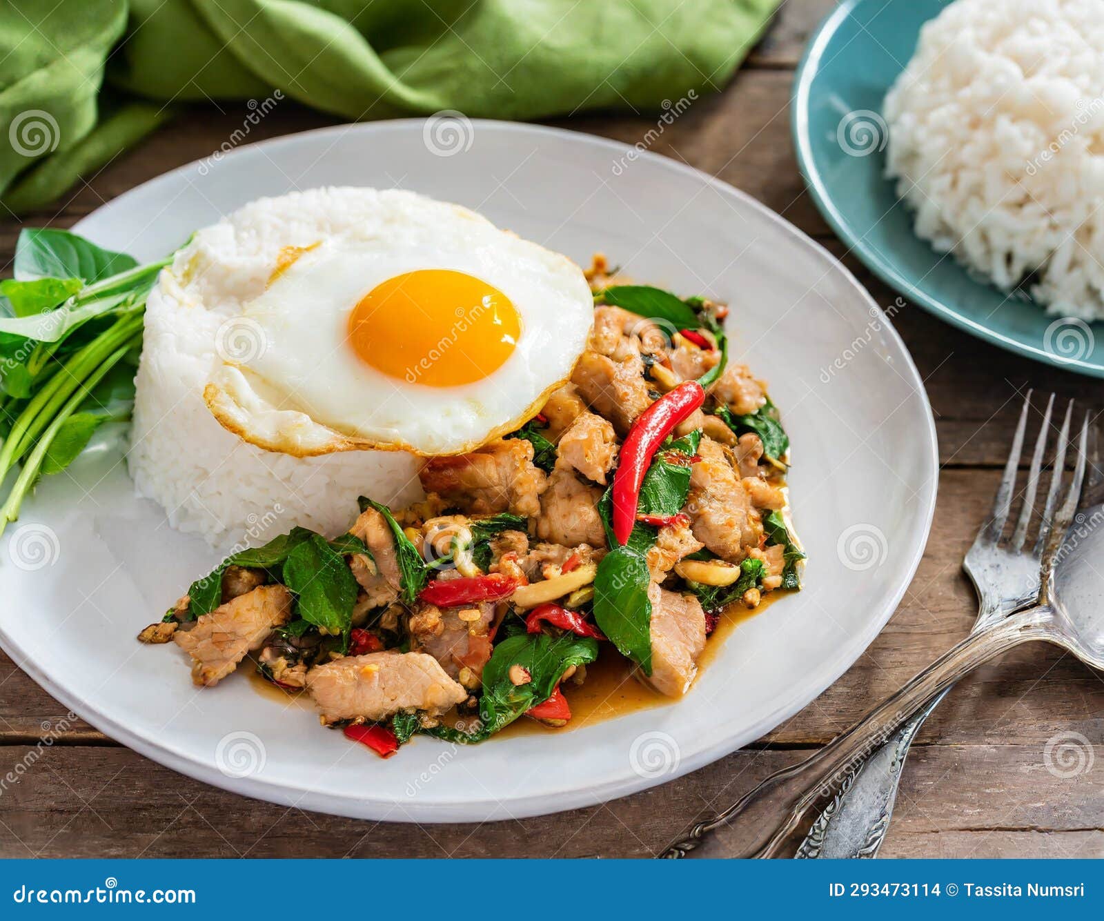 A Traditional Plate Of Moo Pad Krapow, Stir-fried Pork With Basil And ...