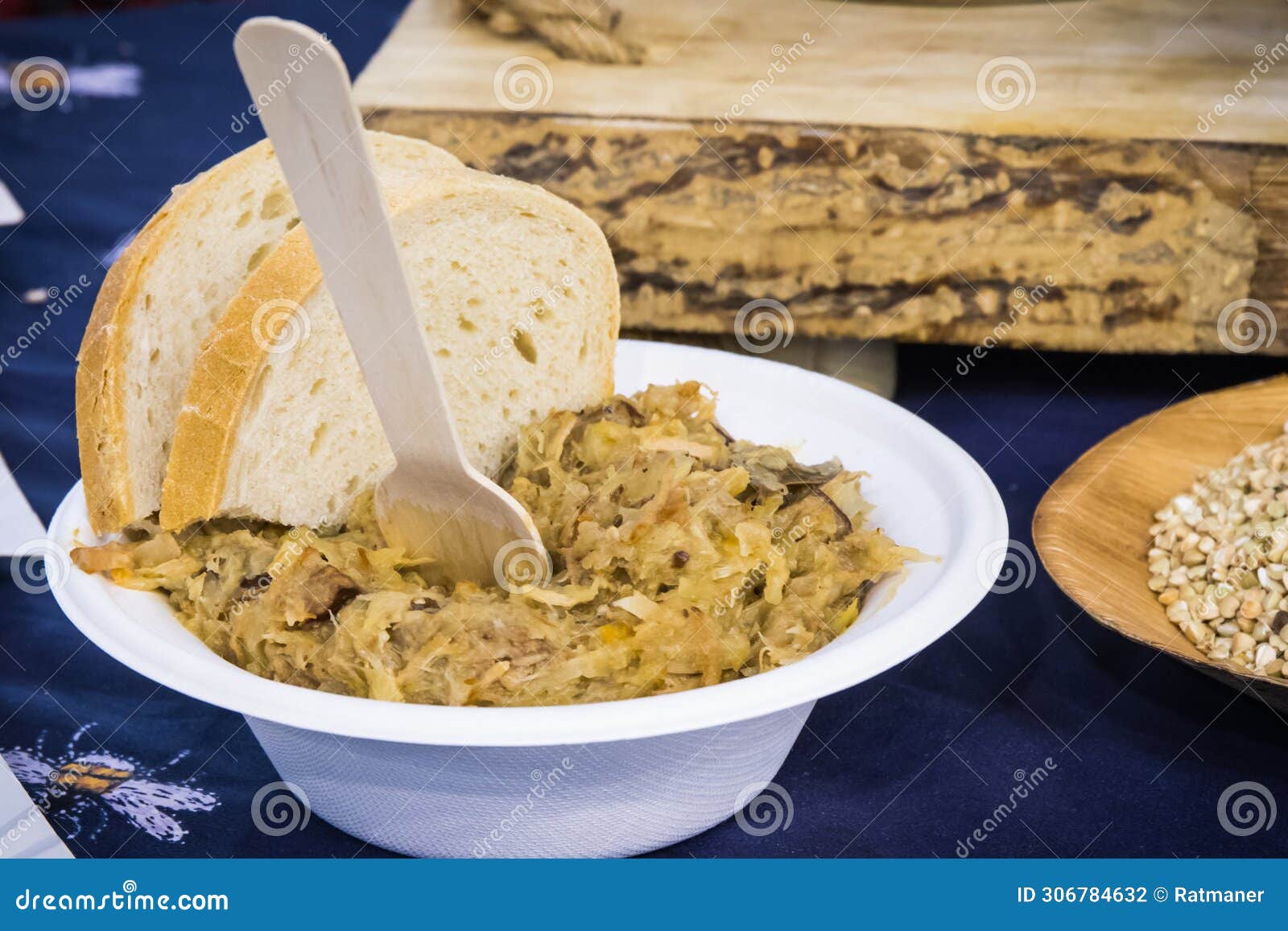 Traditional Polish Dish Bigos and Pieces of Wheat Bread Stock Photo ...