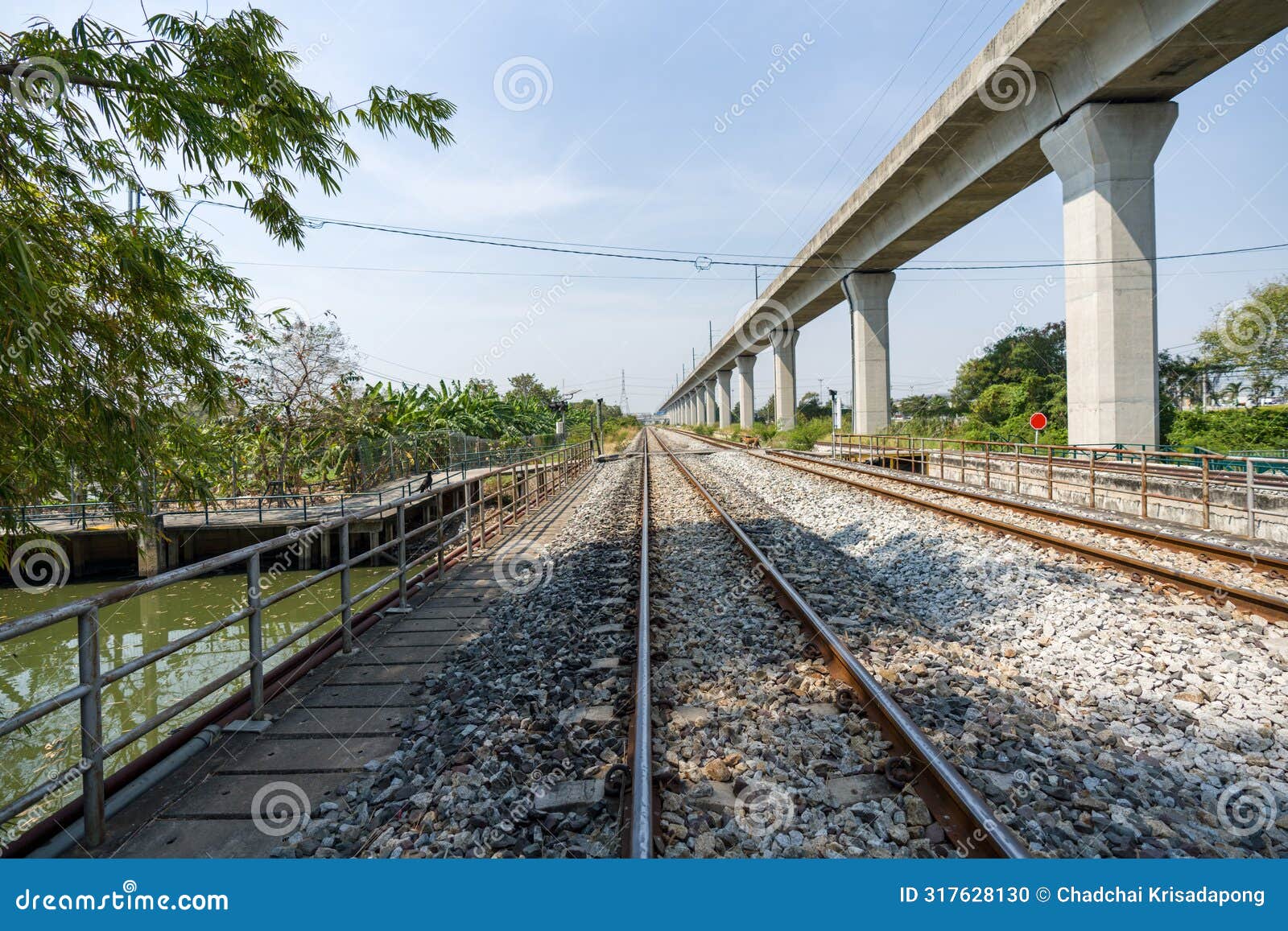 A Traditional Railway Track Lined with Gravel Ballast Running Parallel ... A Traditional Railway Track Lined with Gravel Ballast Running Parallel ...