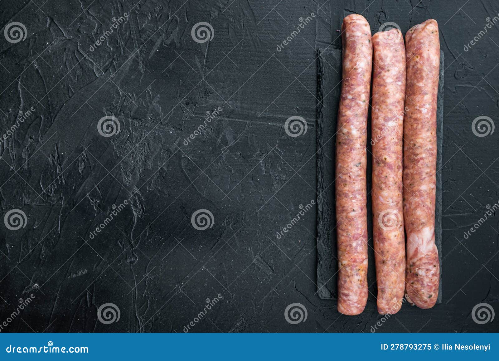 Traditional Raw Beef Sausages, Top View with Space for Text, on Black ...