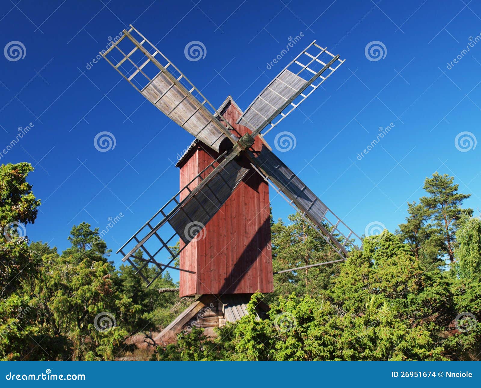 Traditional red windmill stock photo. Image of aland - 26951674