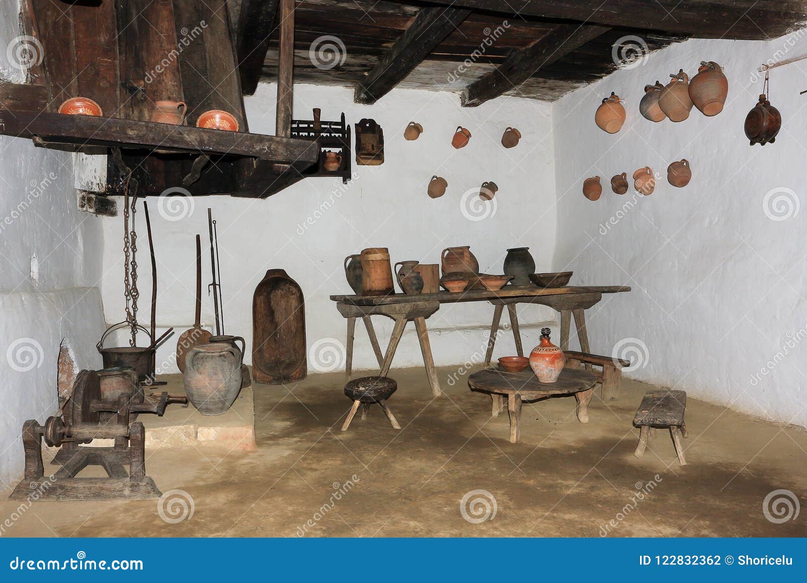 Traditional Romanian Interior of a Kitchen with Many Tools and a Stock ...