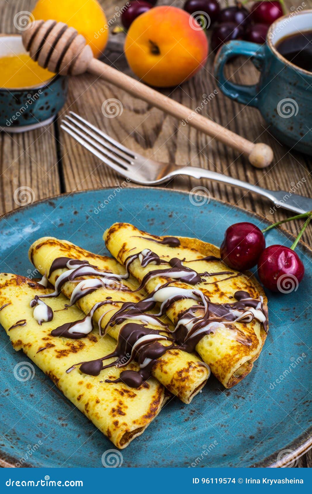 Traditional Russian Breakfast Pancakes with Fruit and Honey Stock Photo ...