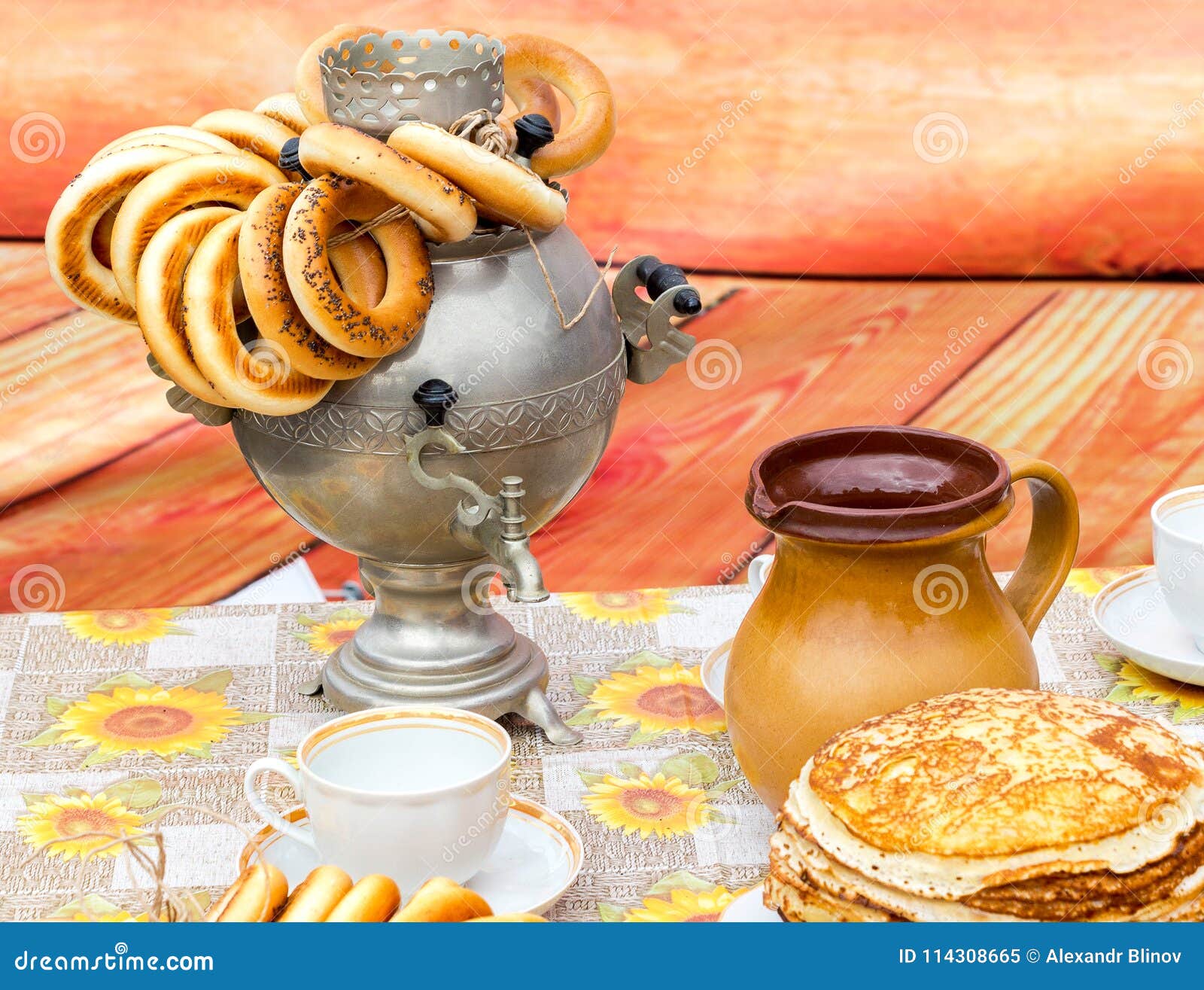 Traditional Russian Samovar with Tasty Bagels and Ceramic Tableware ...