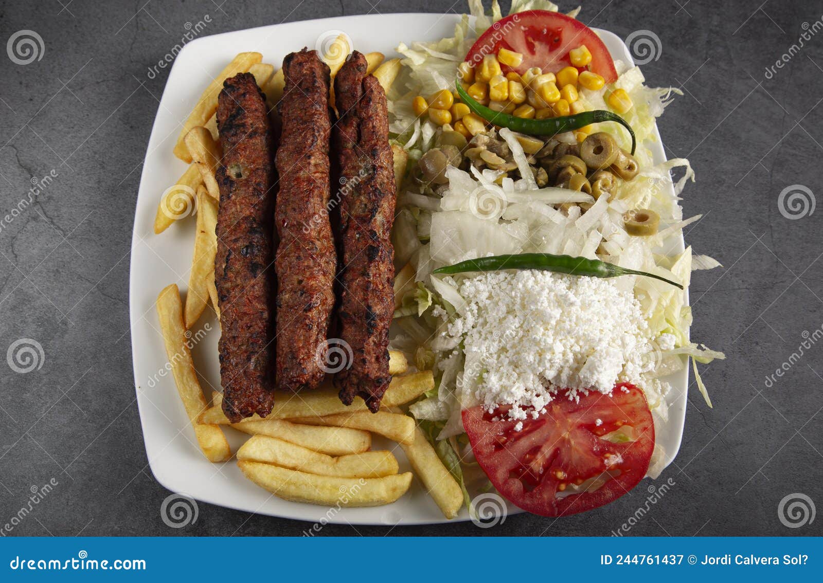 Traditional Sheek Kebab Kebab Dish with Salad and Chips Stock Image ...