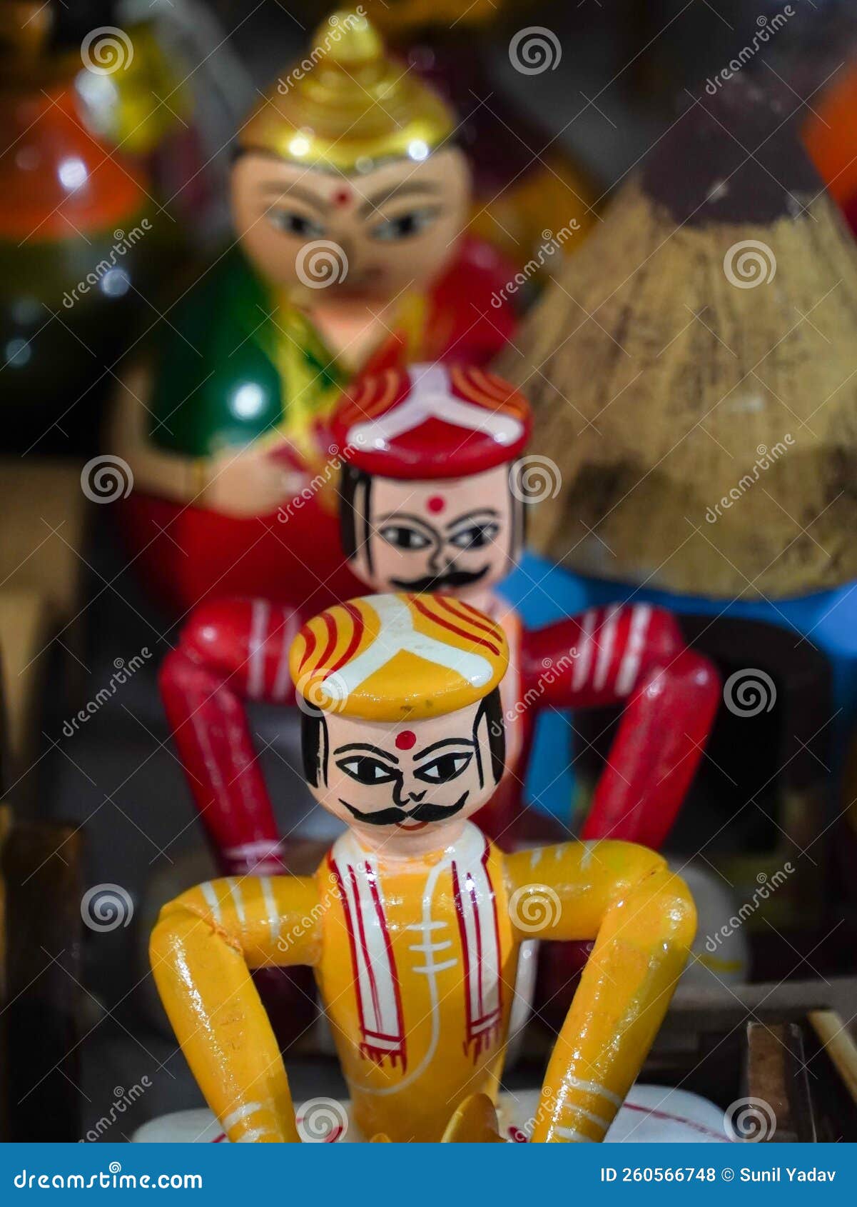 Traditional Small Statue of a Indian Man in Yellow Dress Code Stock ...