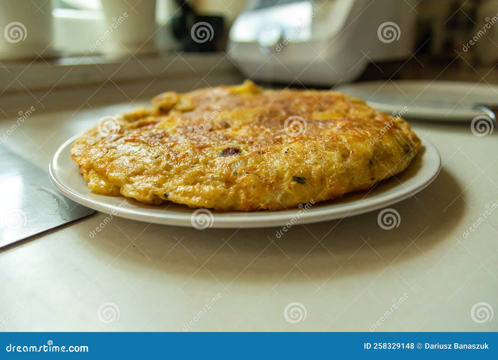 Traditional Spanish Tortilla on a Plate, Prepared at Home Stock Photo ...