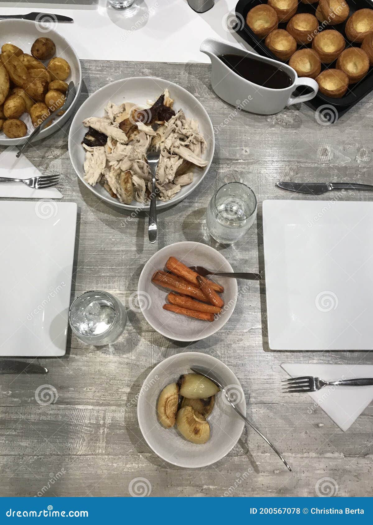 Sunday roast at the table stock photo. Image of knife - 200567078