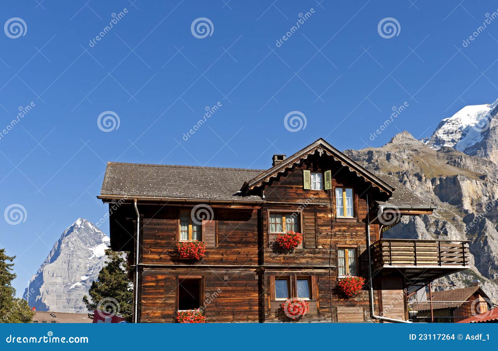 Traditional Swiss chalet stock photo. Image of apartment - 23117264