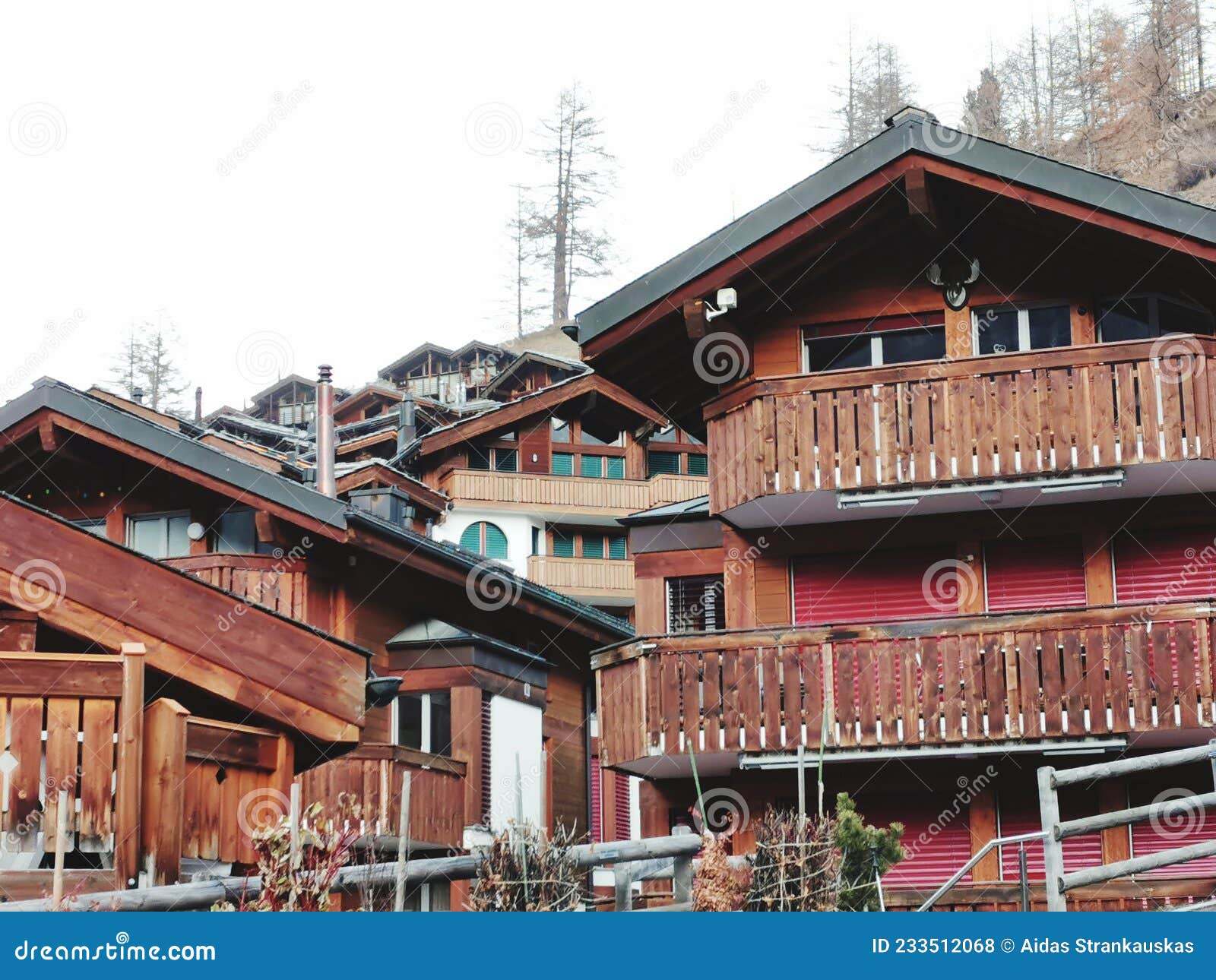 Traditional swiss chalets stock photo. Image of town - 233512068