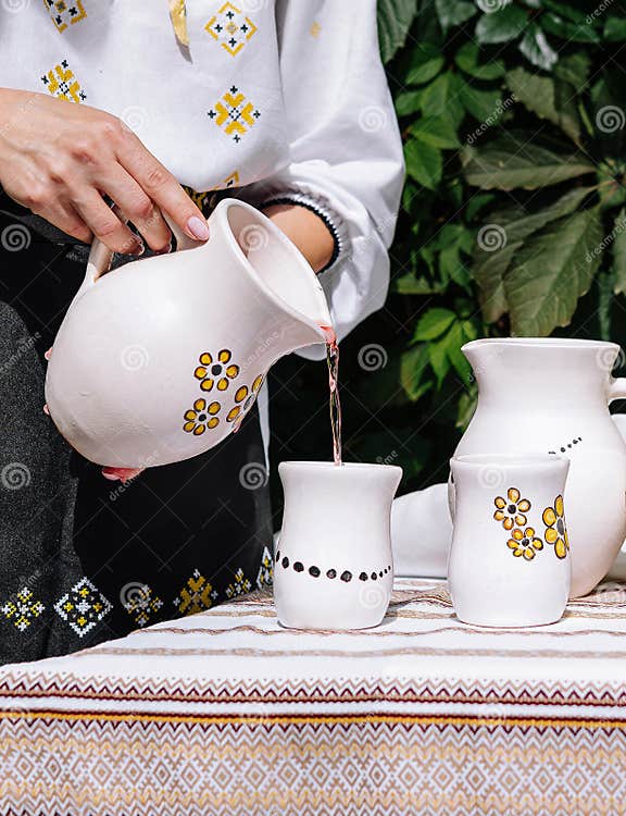 Traditional Table Setting with Handmade Ceramic Pitchers Stock Photo ...