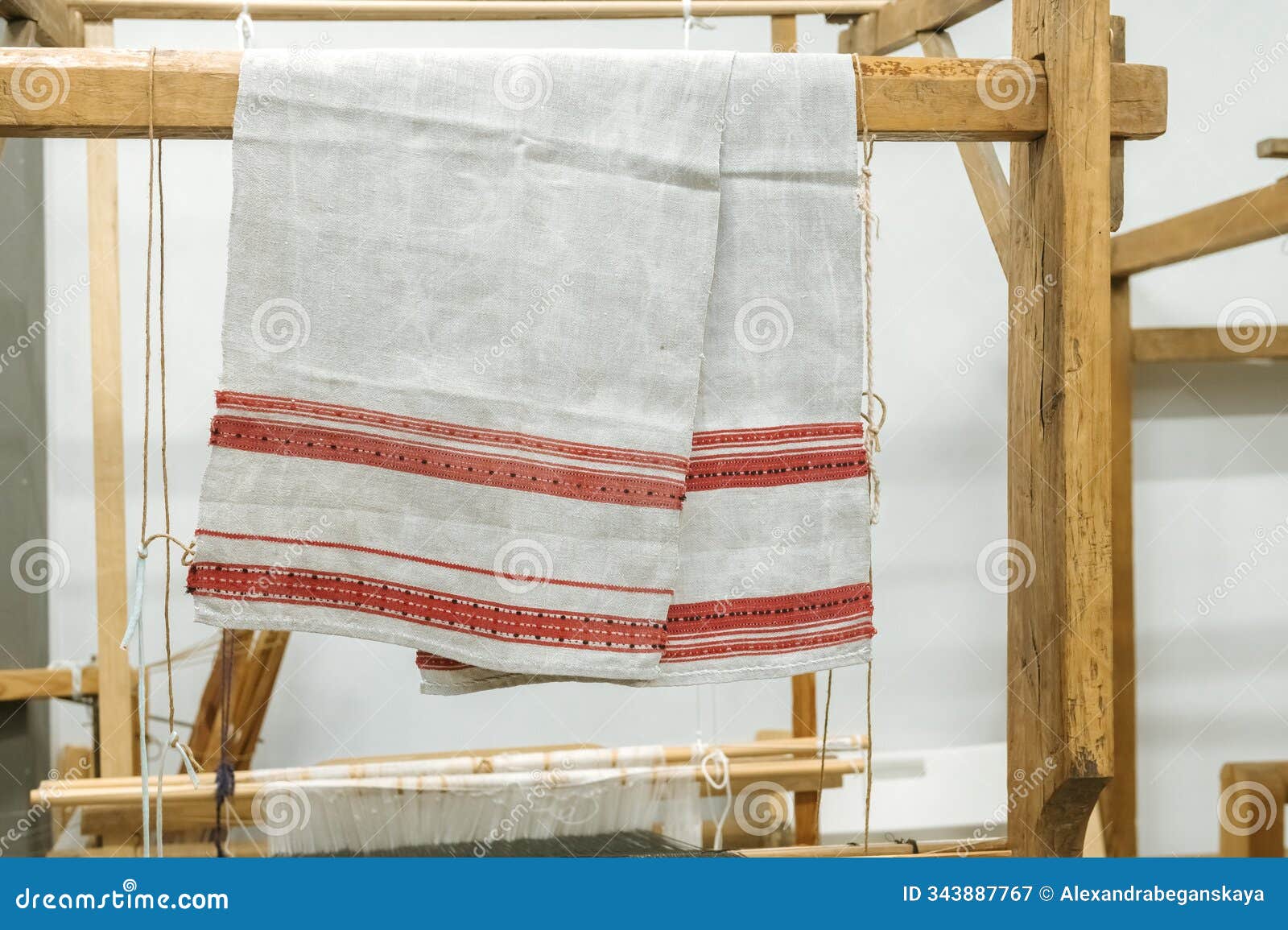 Traditional Textile with Red Stripes on Wooden Loom Display Stock Image ...