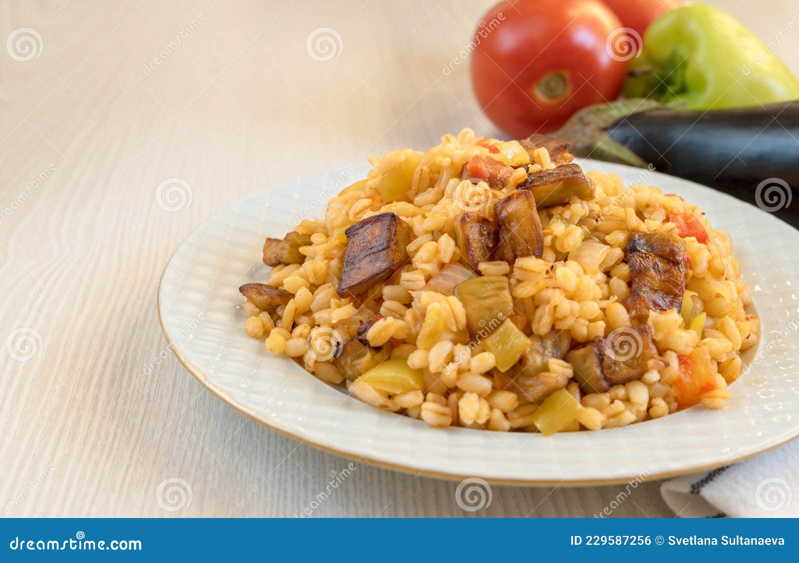Traditional Turkish Pilaf from Bulgur, Vegetables and Eggplant on the ...